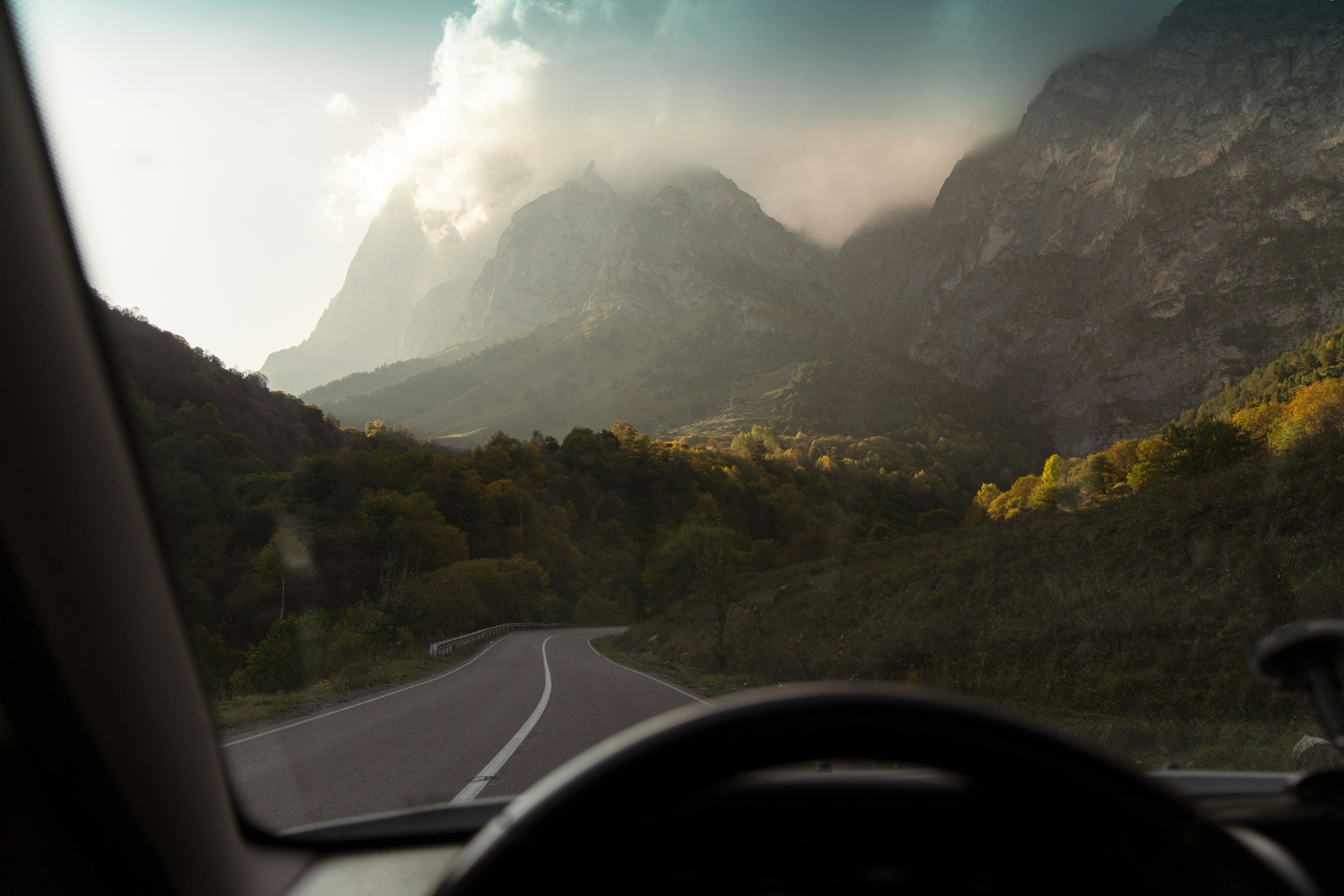 A view from inside a car of a mountain range photo – Free Ingushetia ...