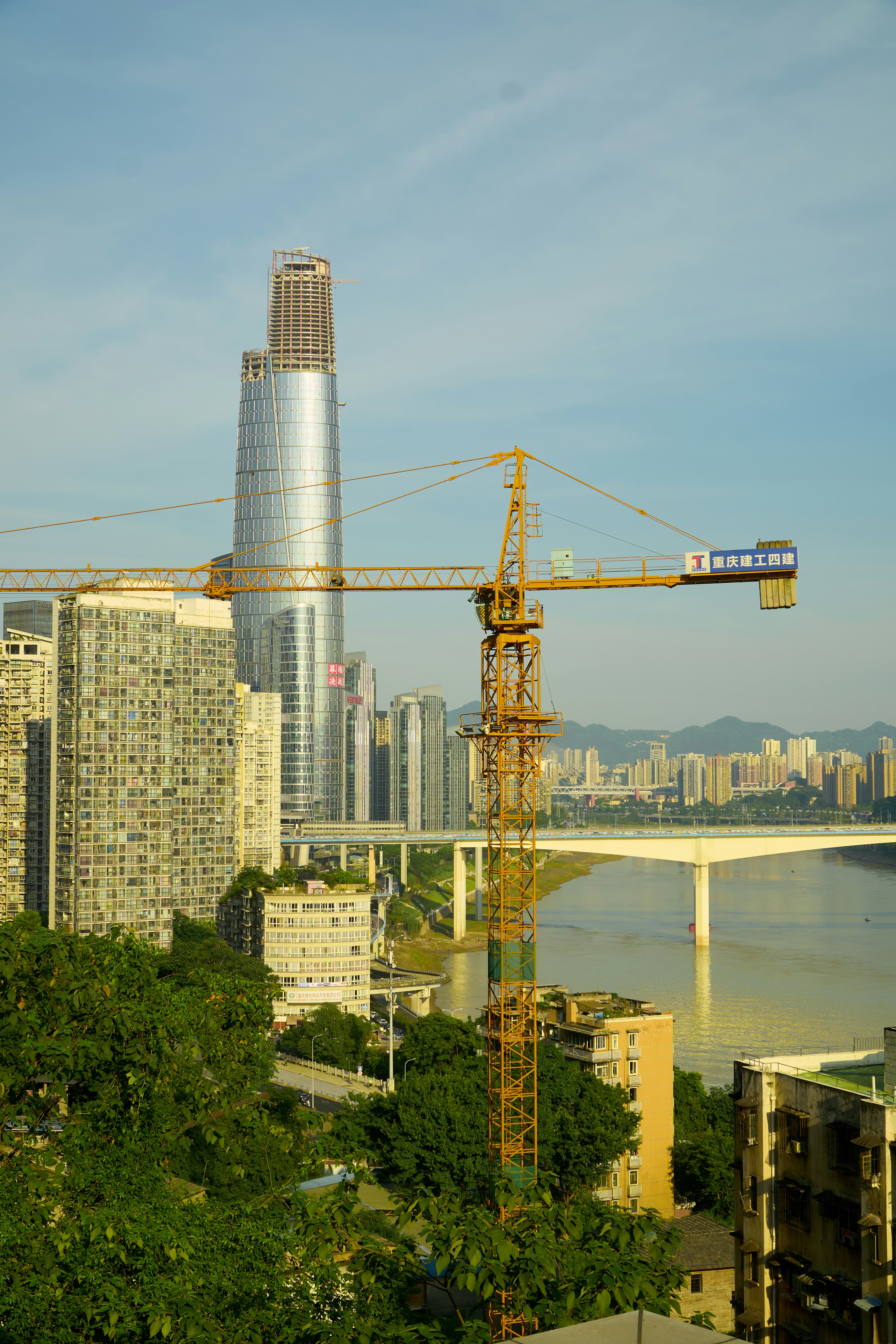 Tower Crane over City Lines: Sunrise Construction in Motion