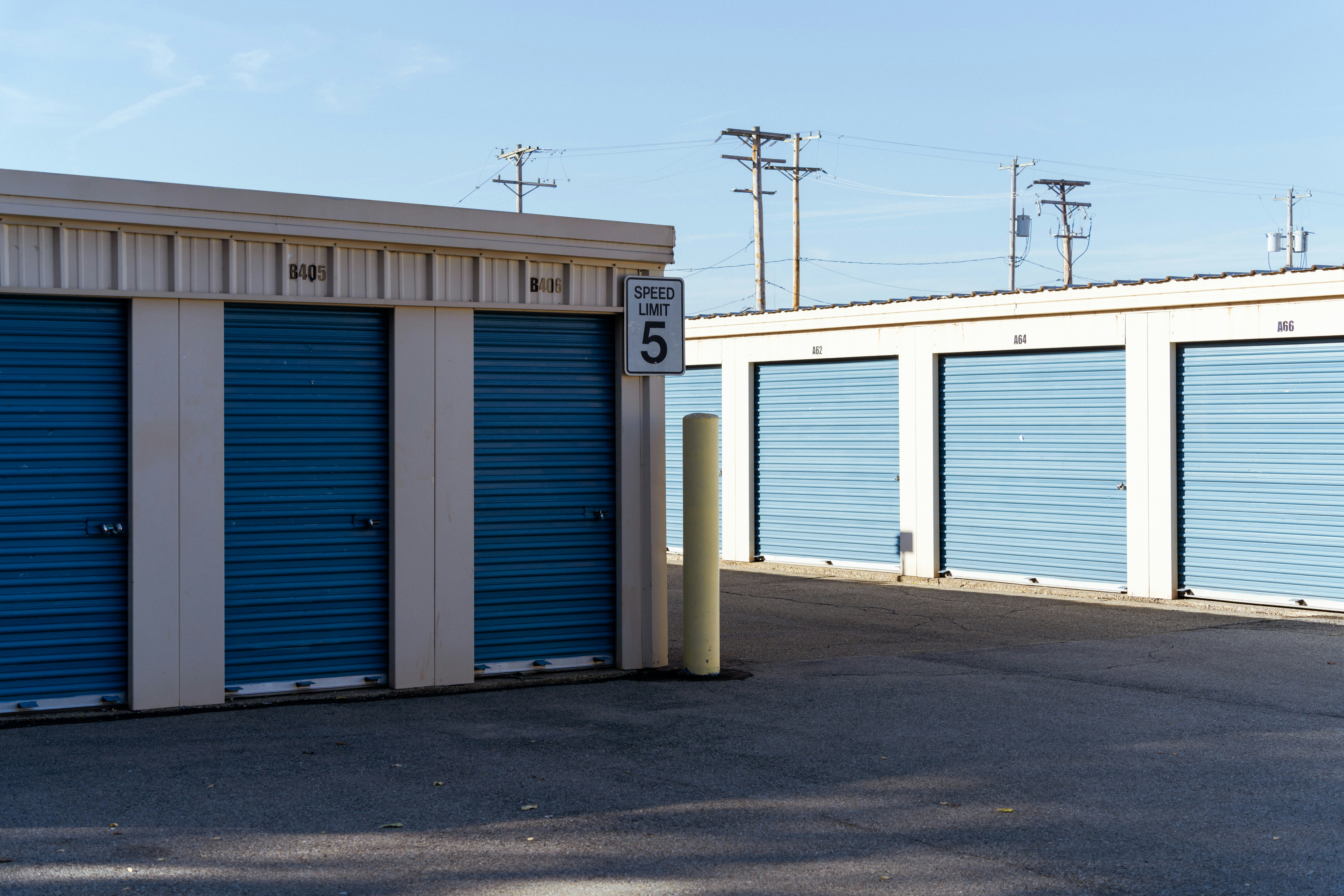 A row of storage units in a parking lot photo – Free Pittsburgh Image ...