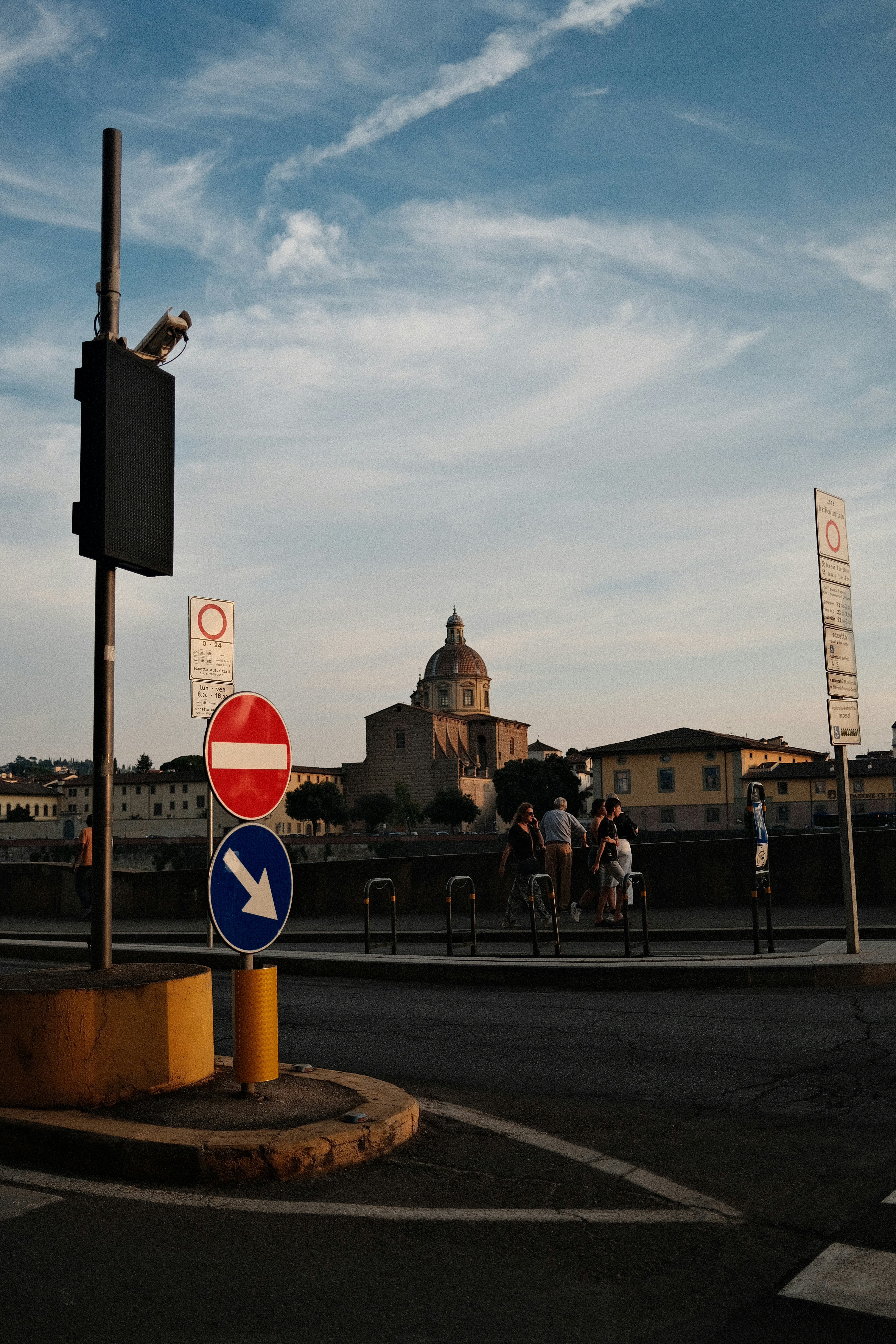 Dome Above the Riverside: Evening Stroll Along a Historic City Promenade