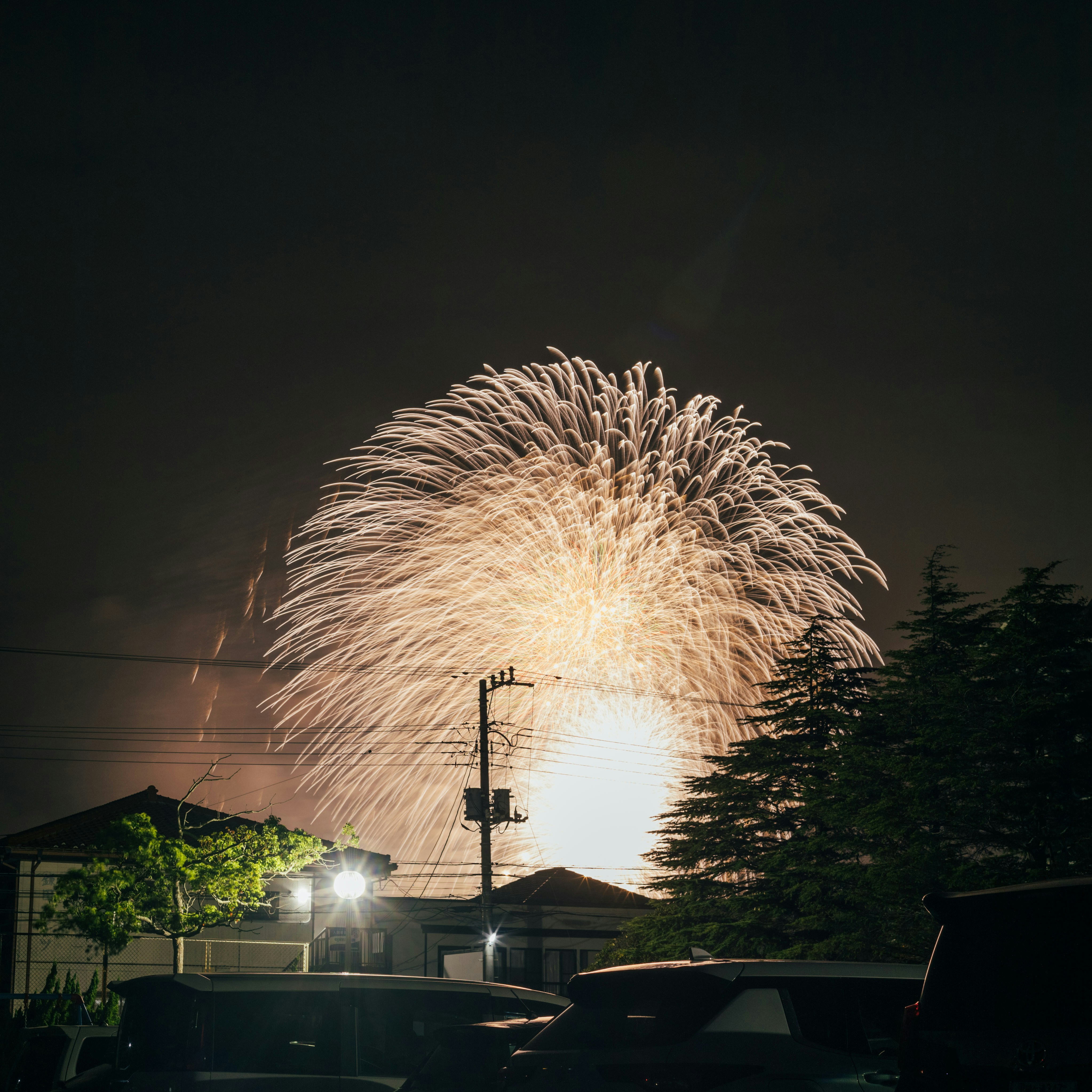 A large fireworks is lit up in the night sky photo – Free Fire works ...