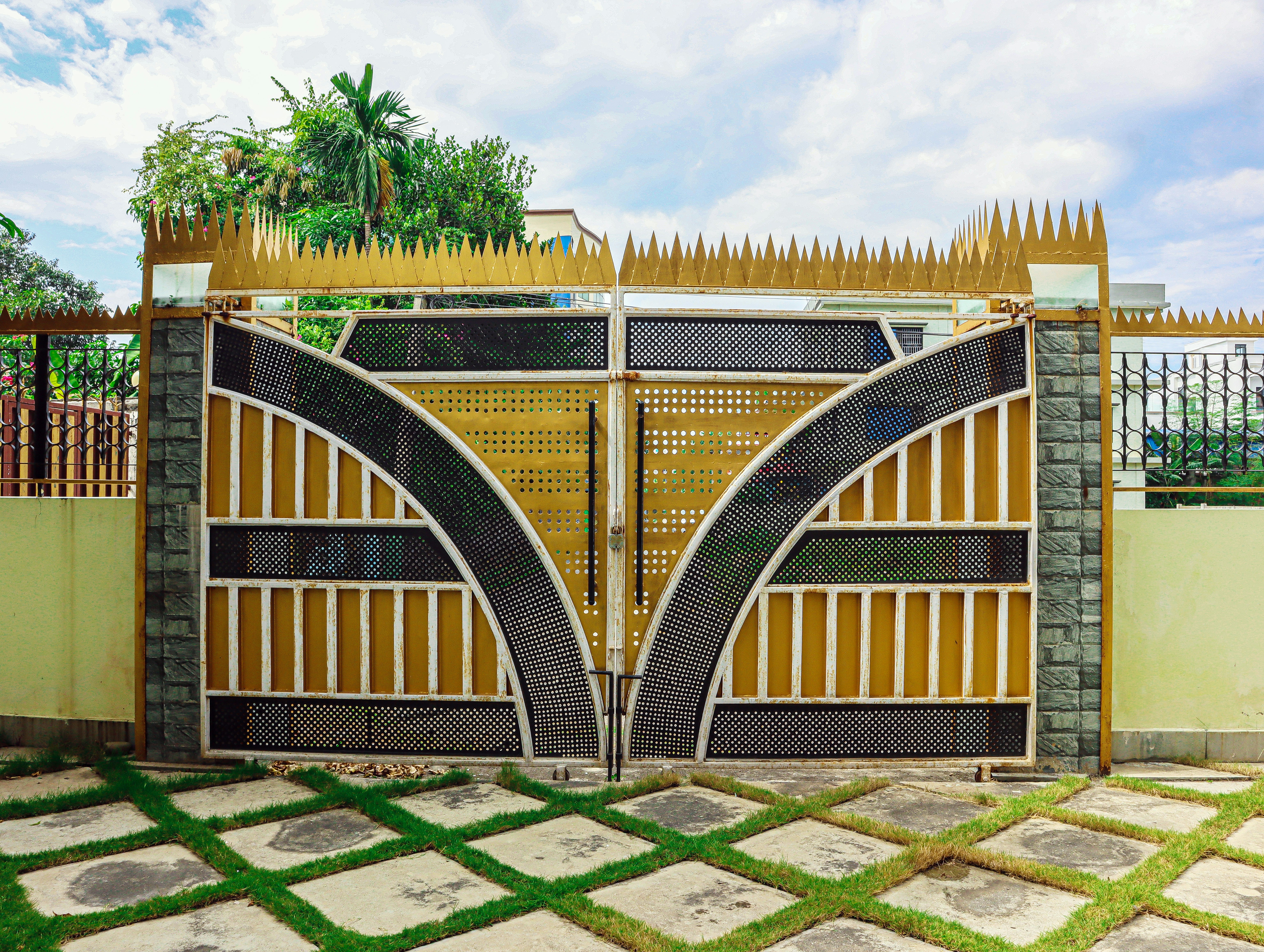 Converging Arches: A Gate of Gold, Iron, and Stone
