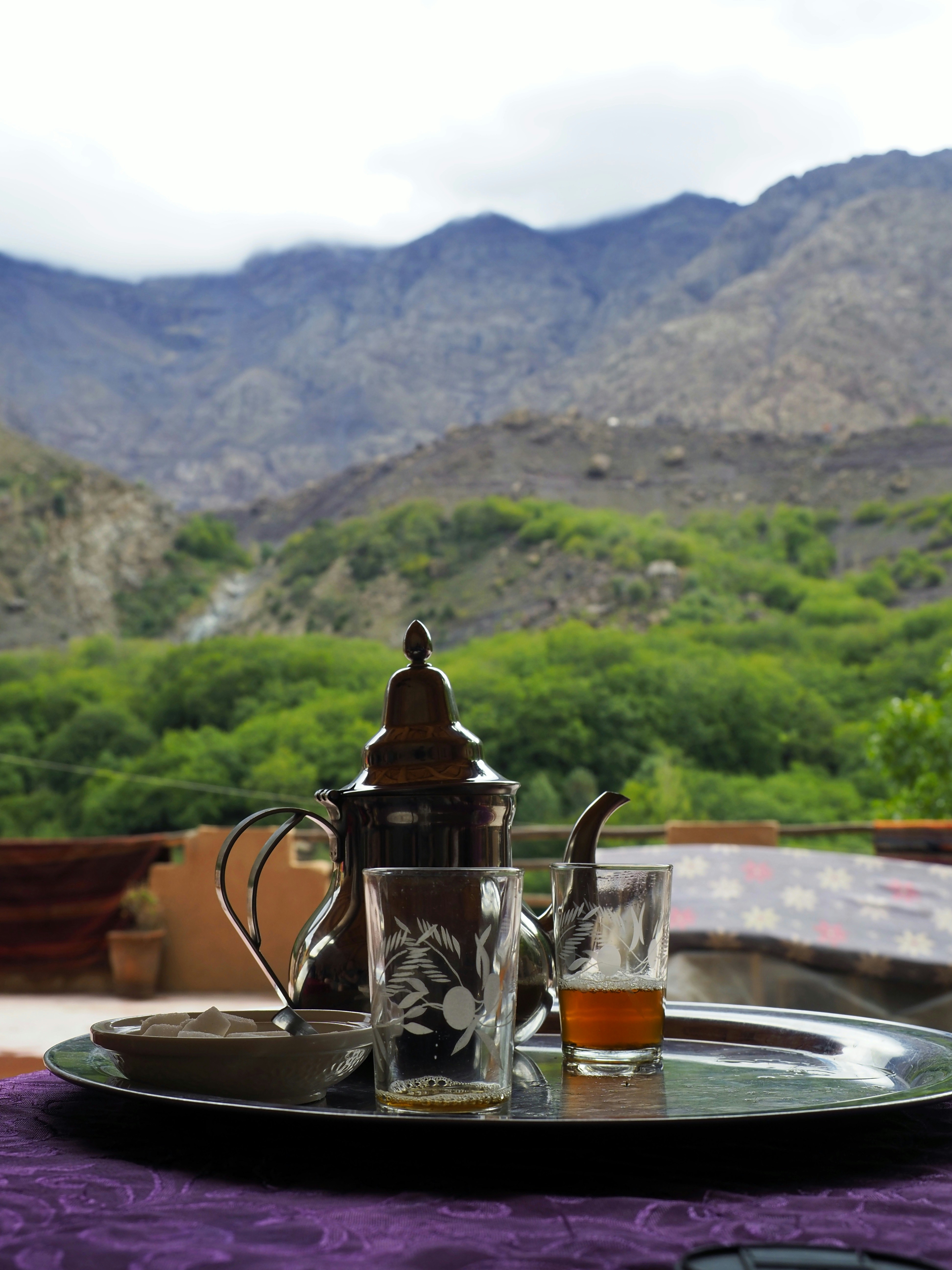 A tray with a tea pot and two glasses on it photo – Free Morocco Image ...