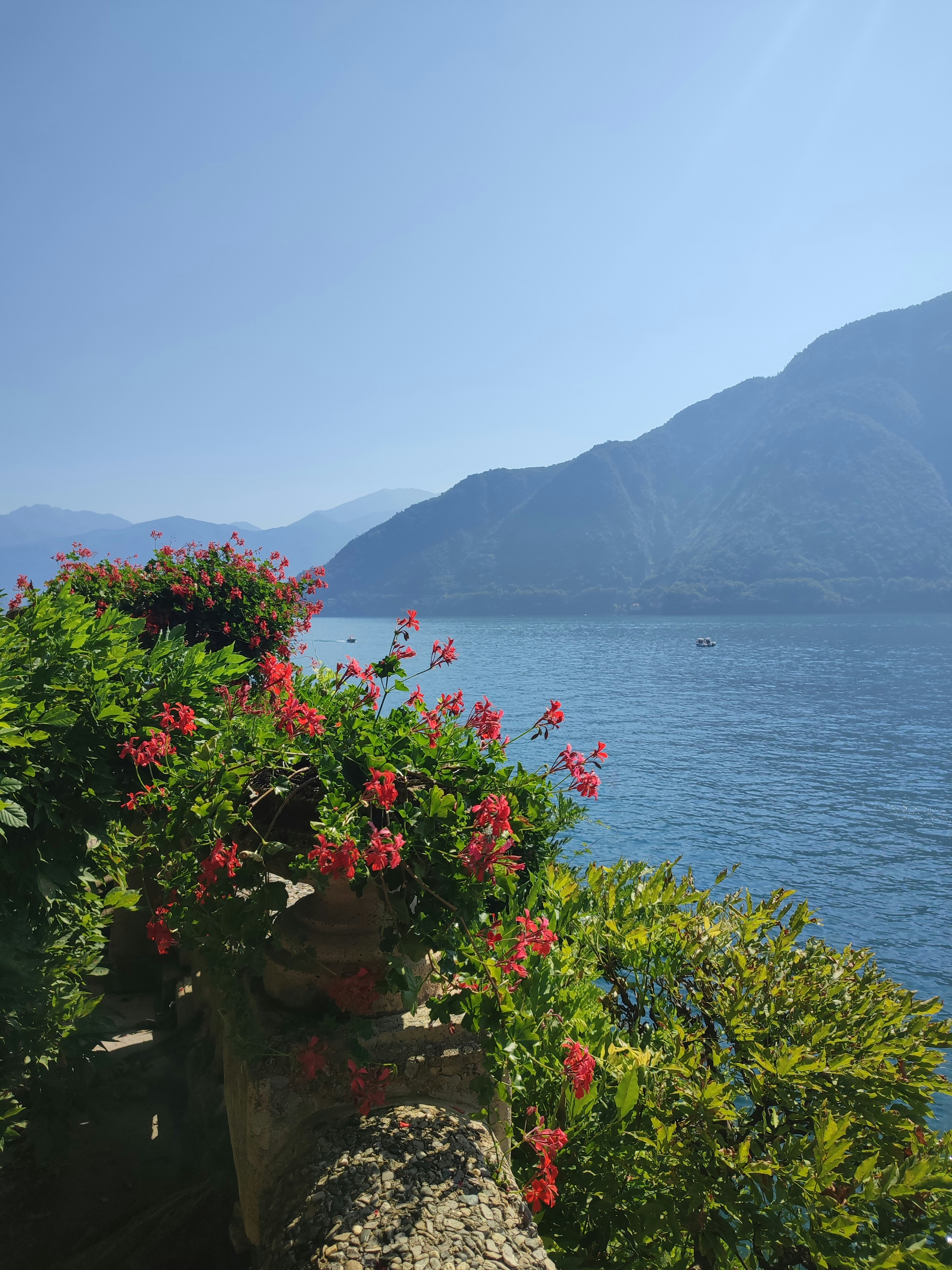 A view of a body of water with mountains in the background