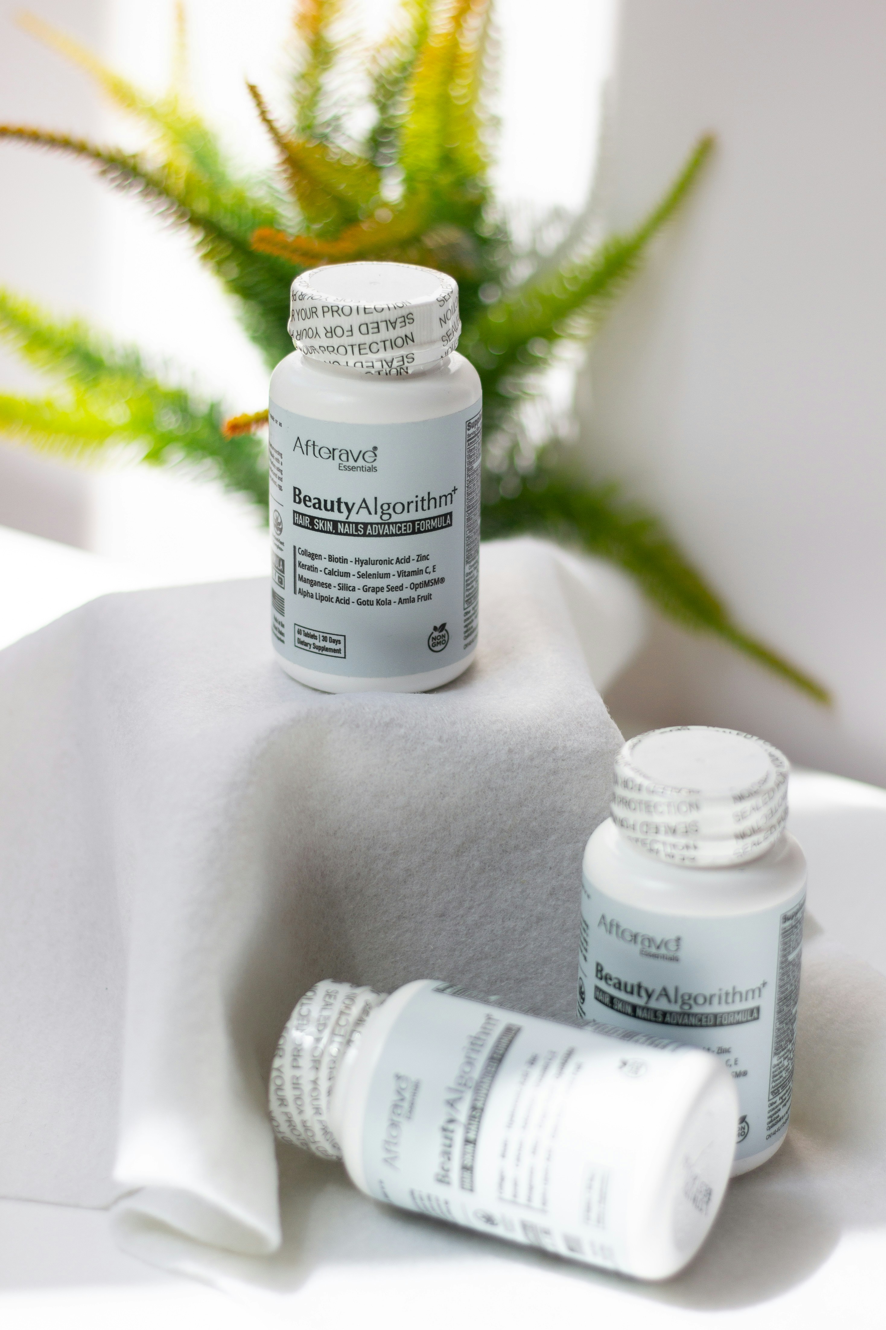 A close up of two bottles of medicine on a table photo – Free ...