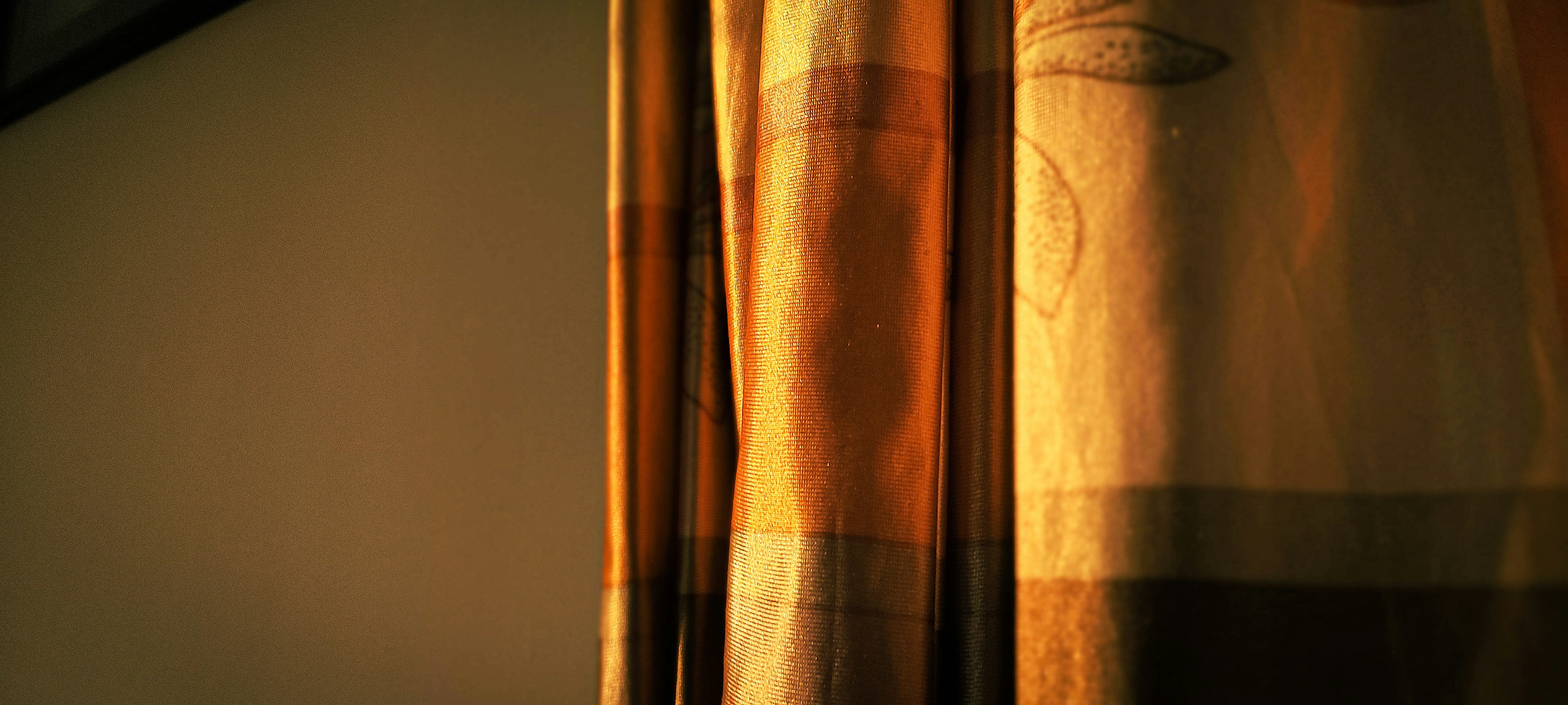 Amber Veil: Close-Up of Light and Linen Fold