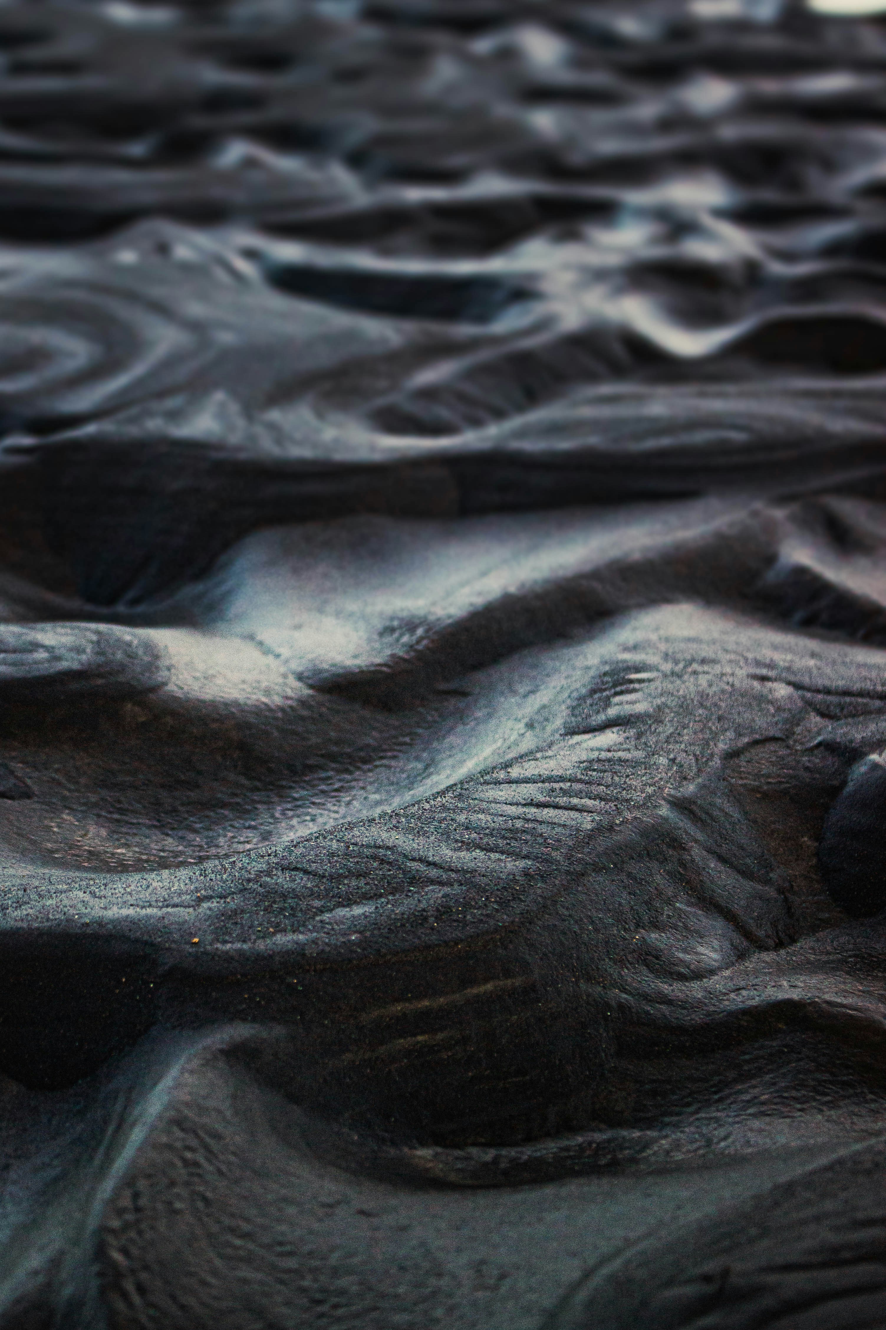 Obsidian Ripplescape: Velvet Black Sand in Quiet Light