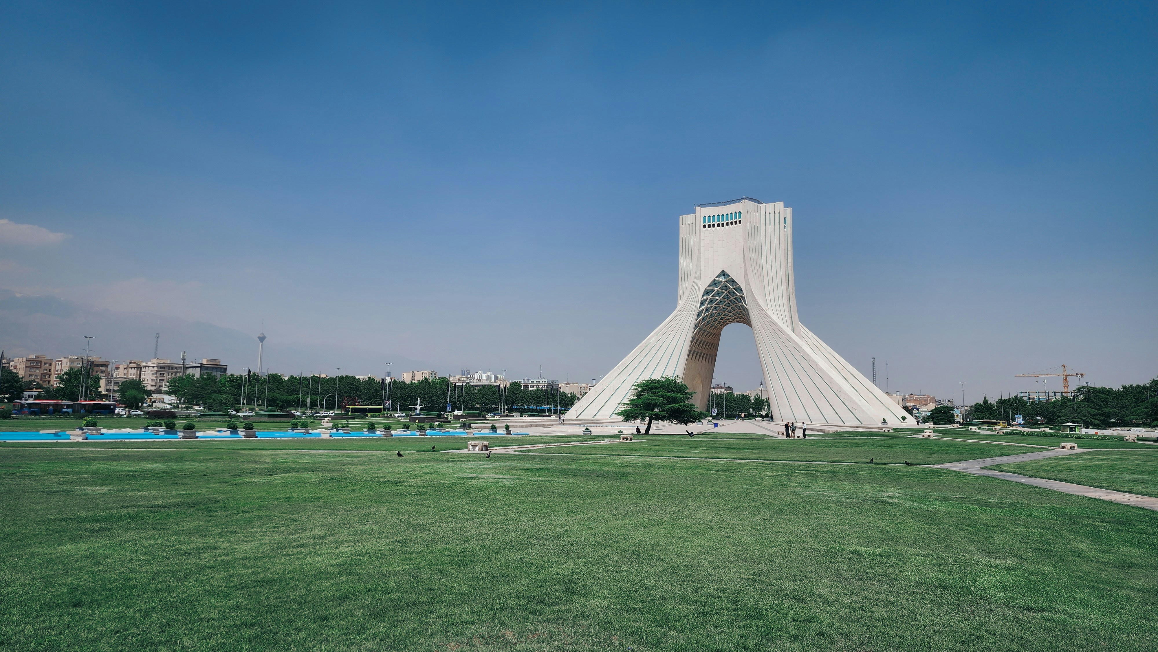 A large monument in the middle of a field photo – Free Tehran Image on ...