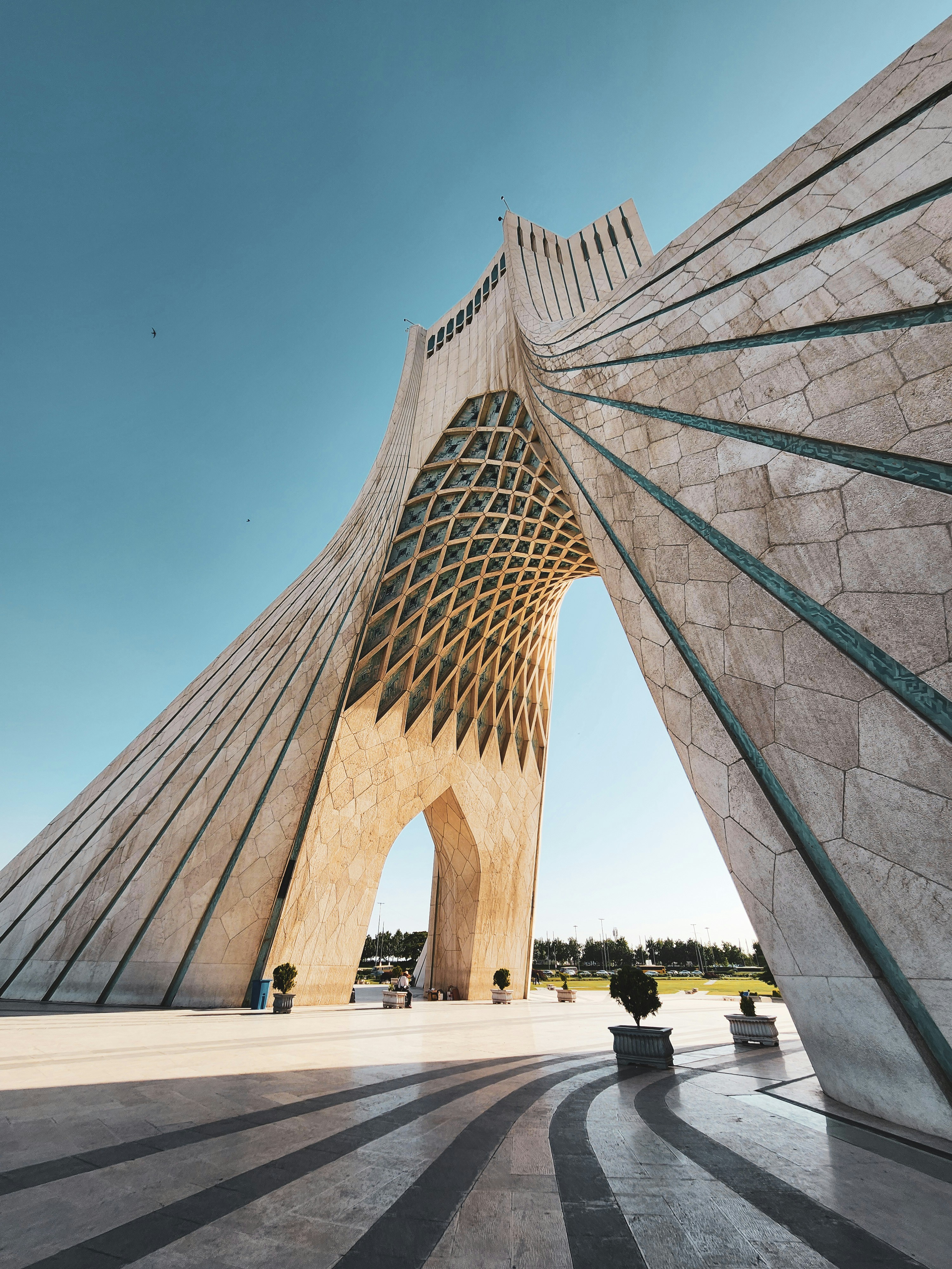 A very tall building with a very tall tower photo – Free Tehran Image ...