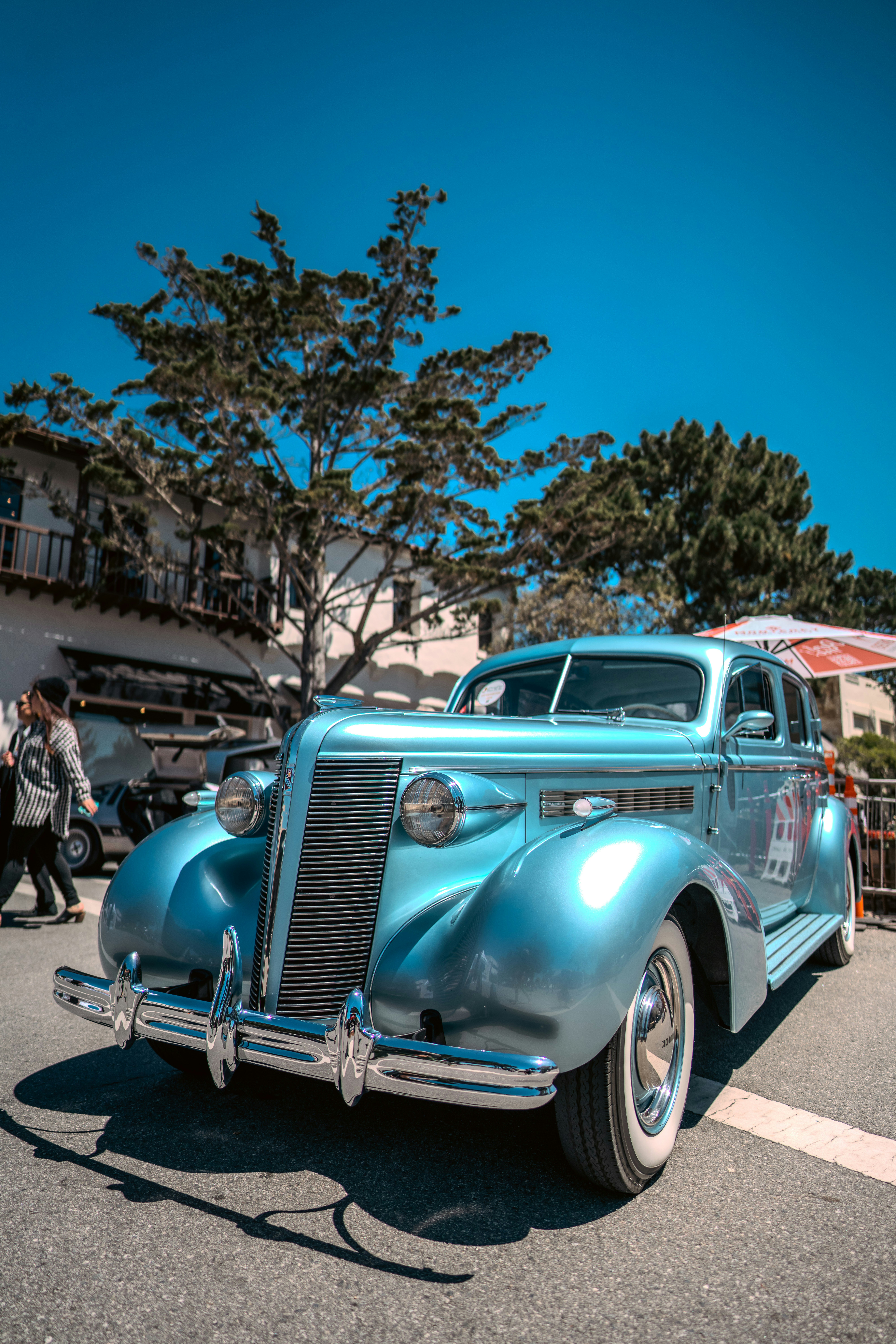 Shimmering Classic: A Teal 1930s Cruiser at Sunset Parade