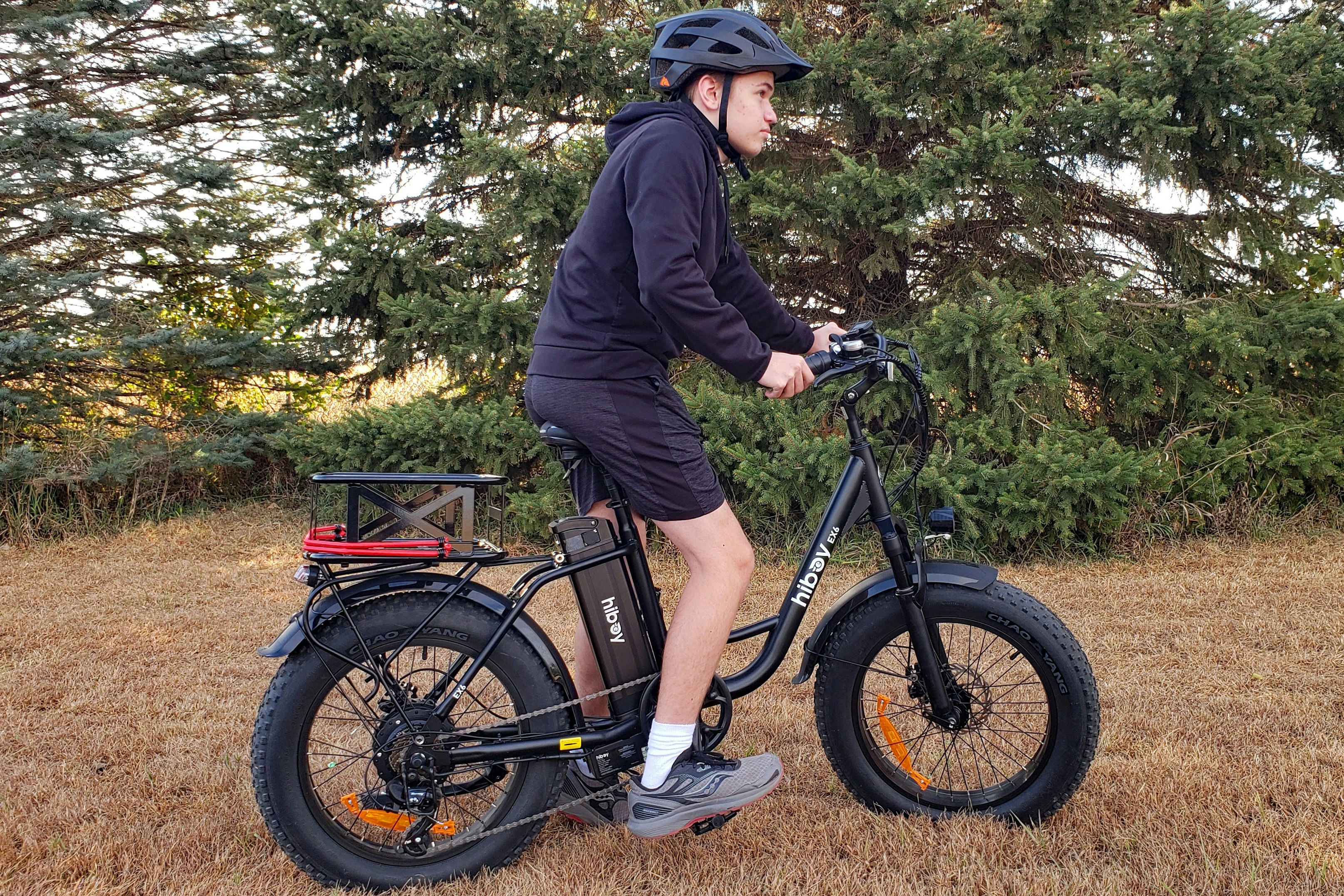 A man riding a bike in a field photo – Free Bike Image on Unsplash