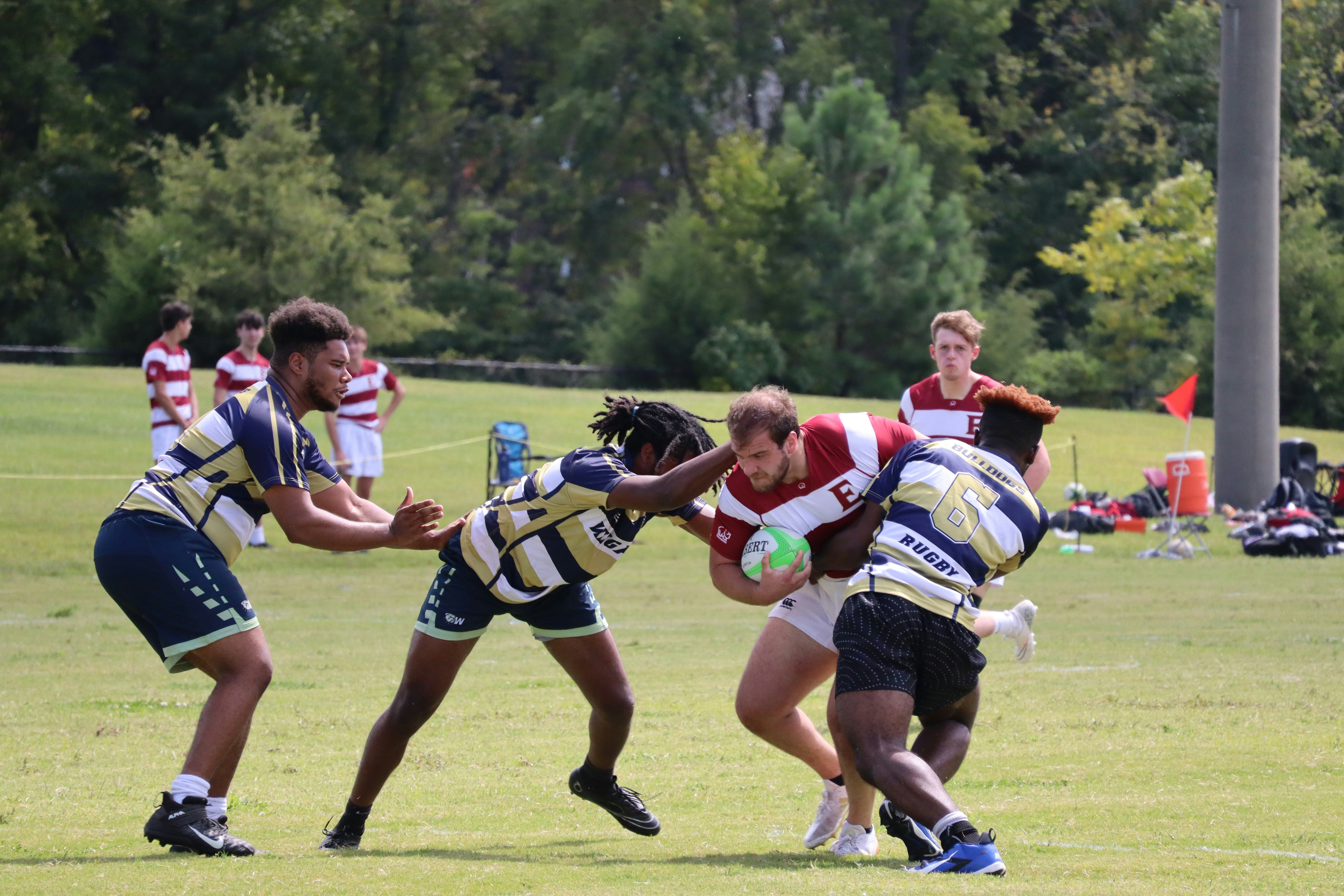 A group of young men playing a game of frisbee photo – Free Sports ...