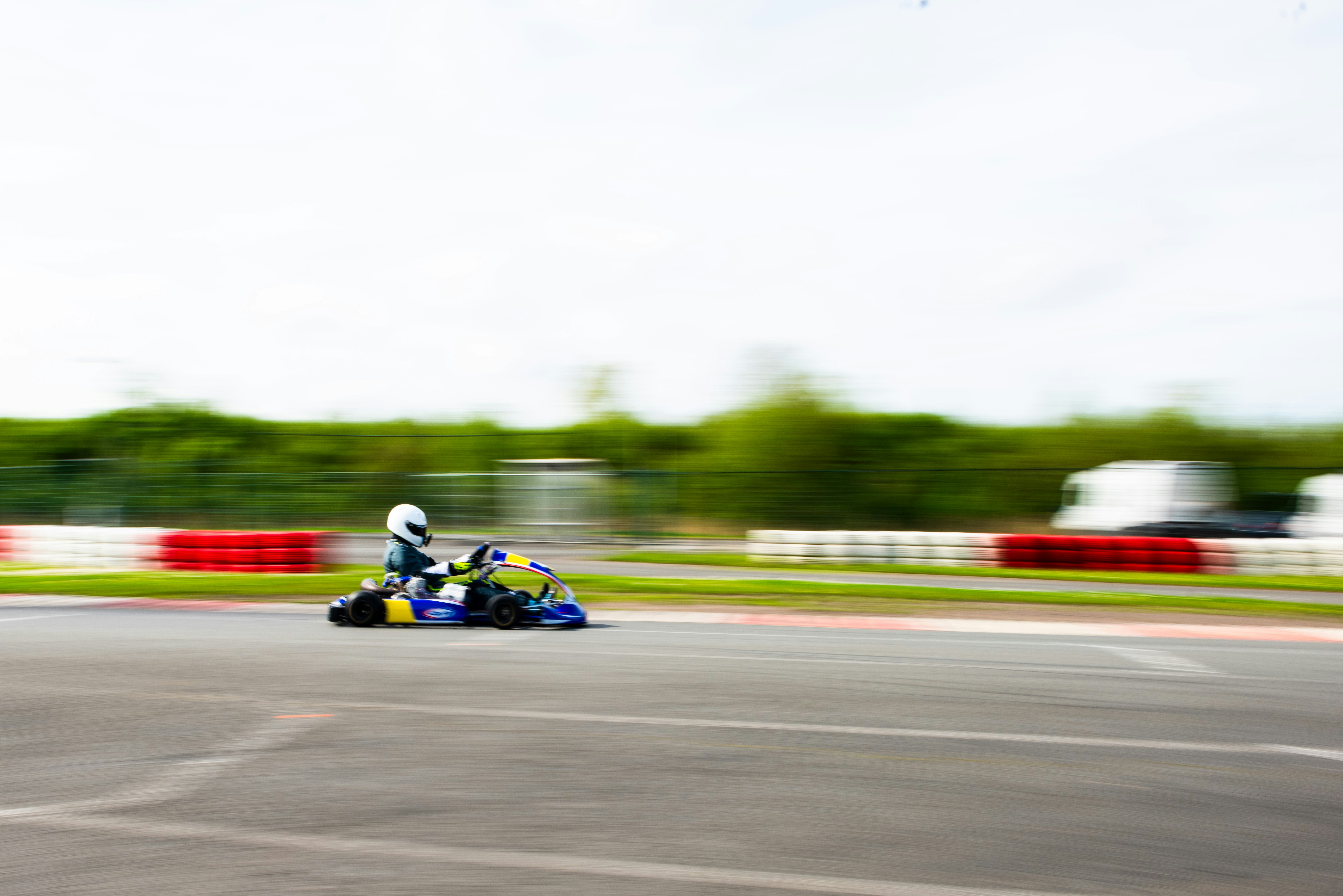 Chasing the Blur: A lone go-kart streaks along a sunlit track