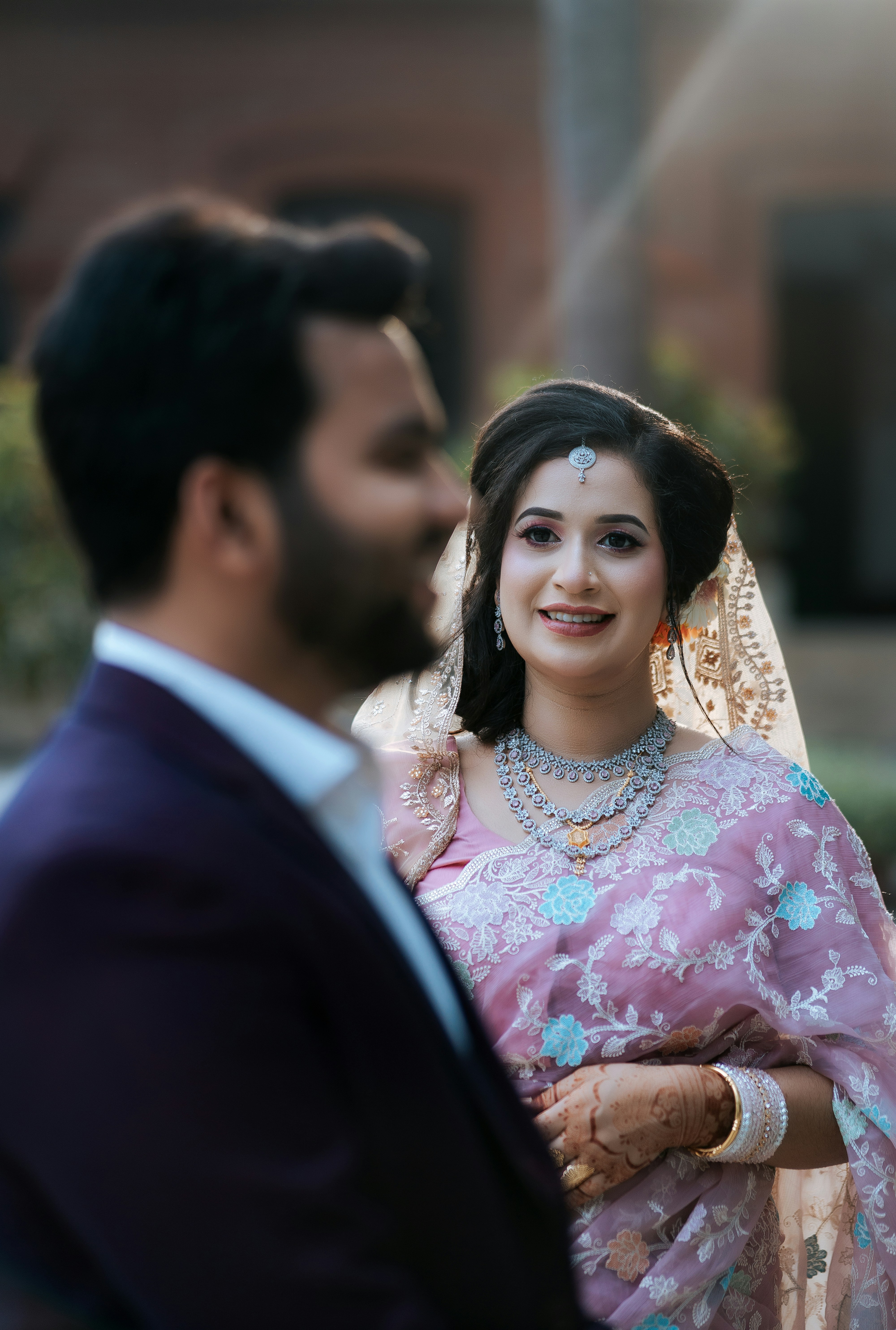 A man and a woman standing next to each other photo – Free Brahmanbaria Image on Unsplash