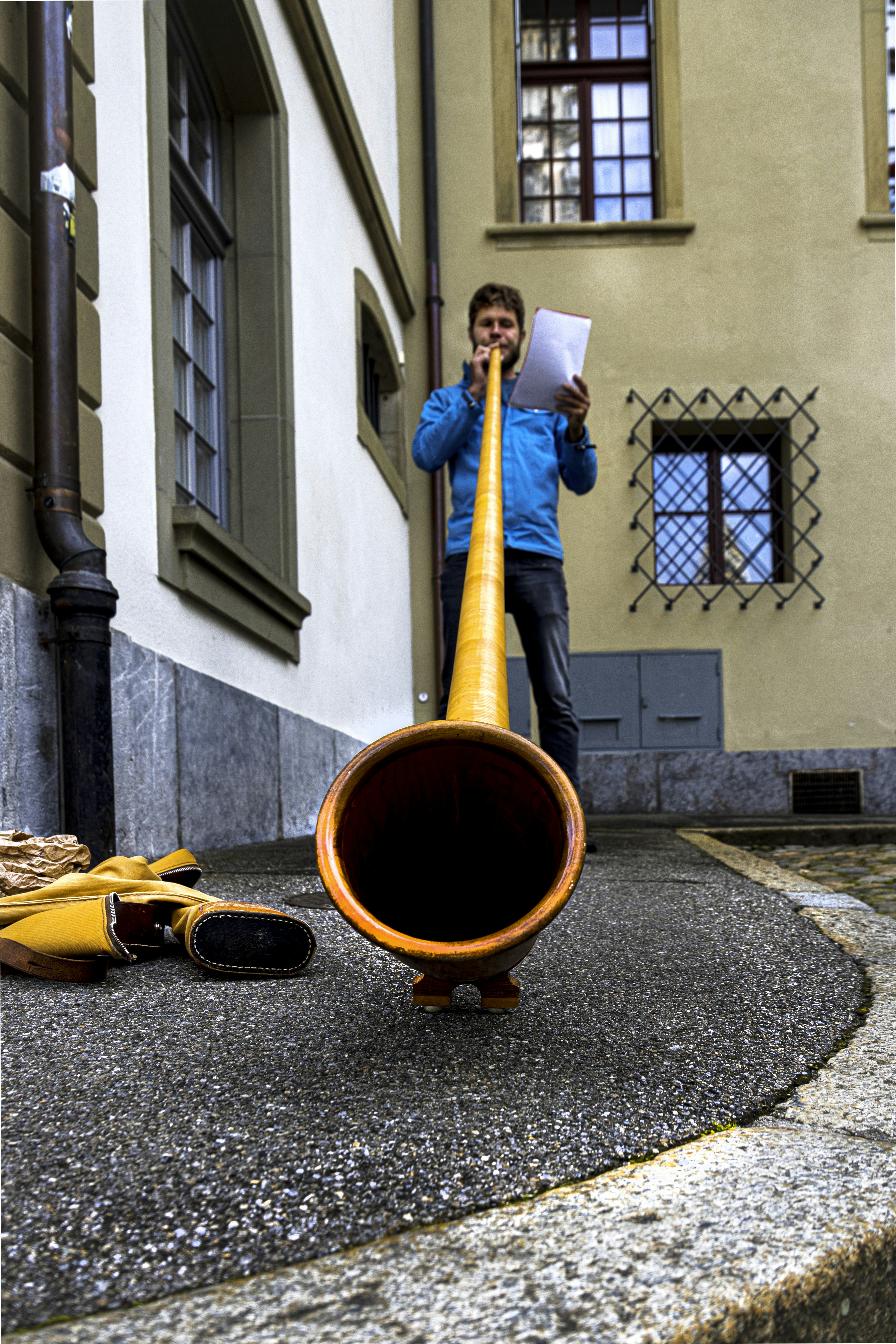 Harmonics in a Courtyard: The Street Saxophonist Enters the Scene