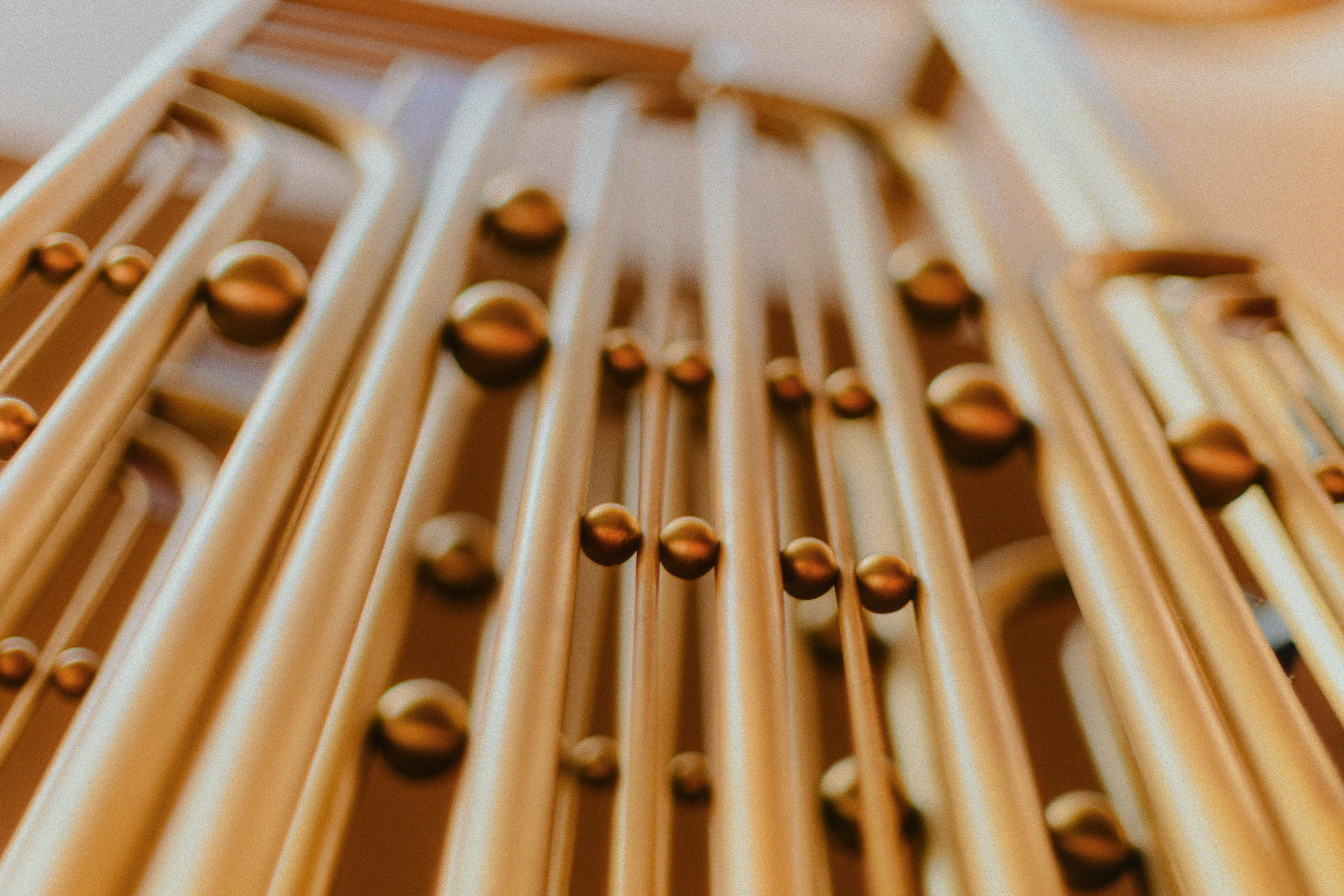 Parallel Rails of Brass: A Macro Study in Curved Lines and Spherical Nodes