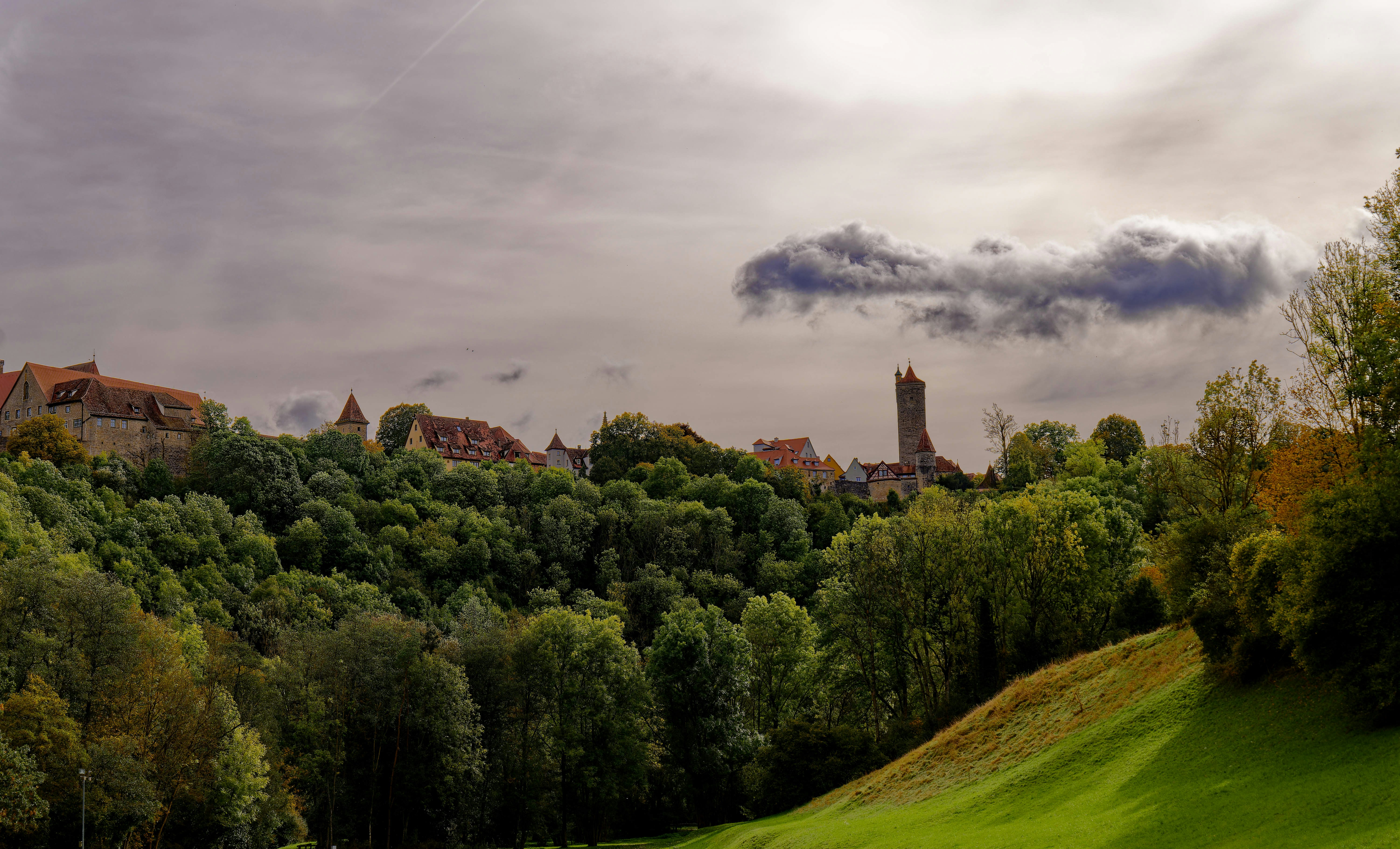 Medieval Spire Rises Over a Verdant Valley