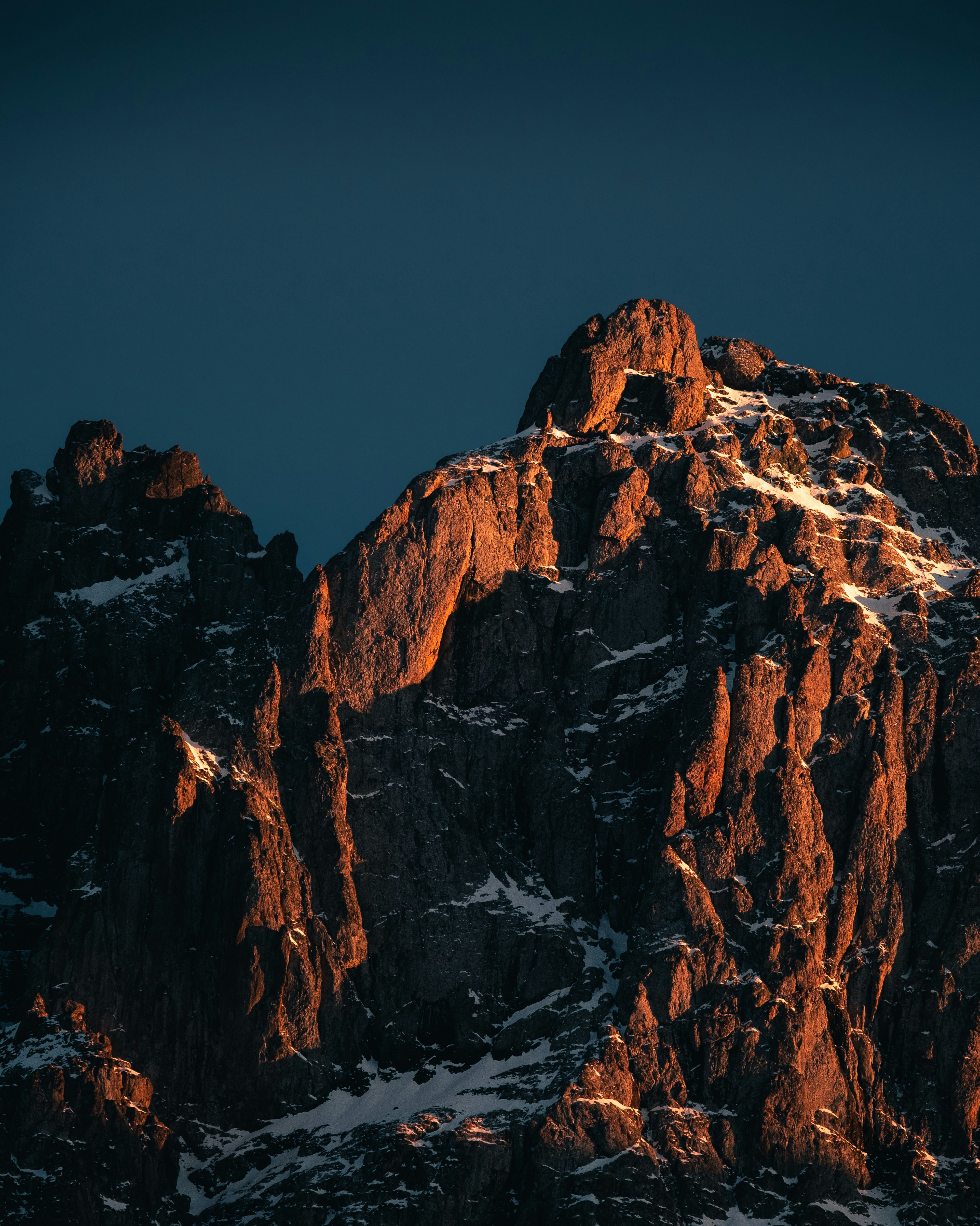 Crimsons on the Crest: Dusk-lit Granite Peaks
