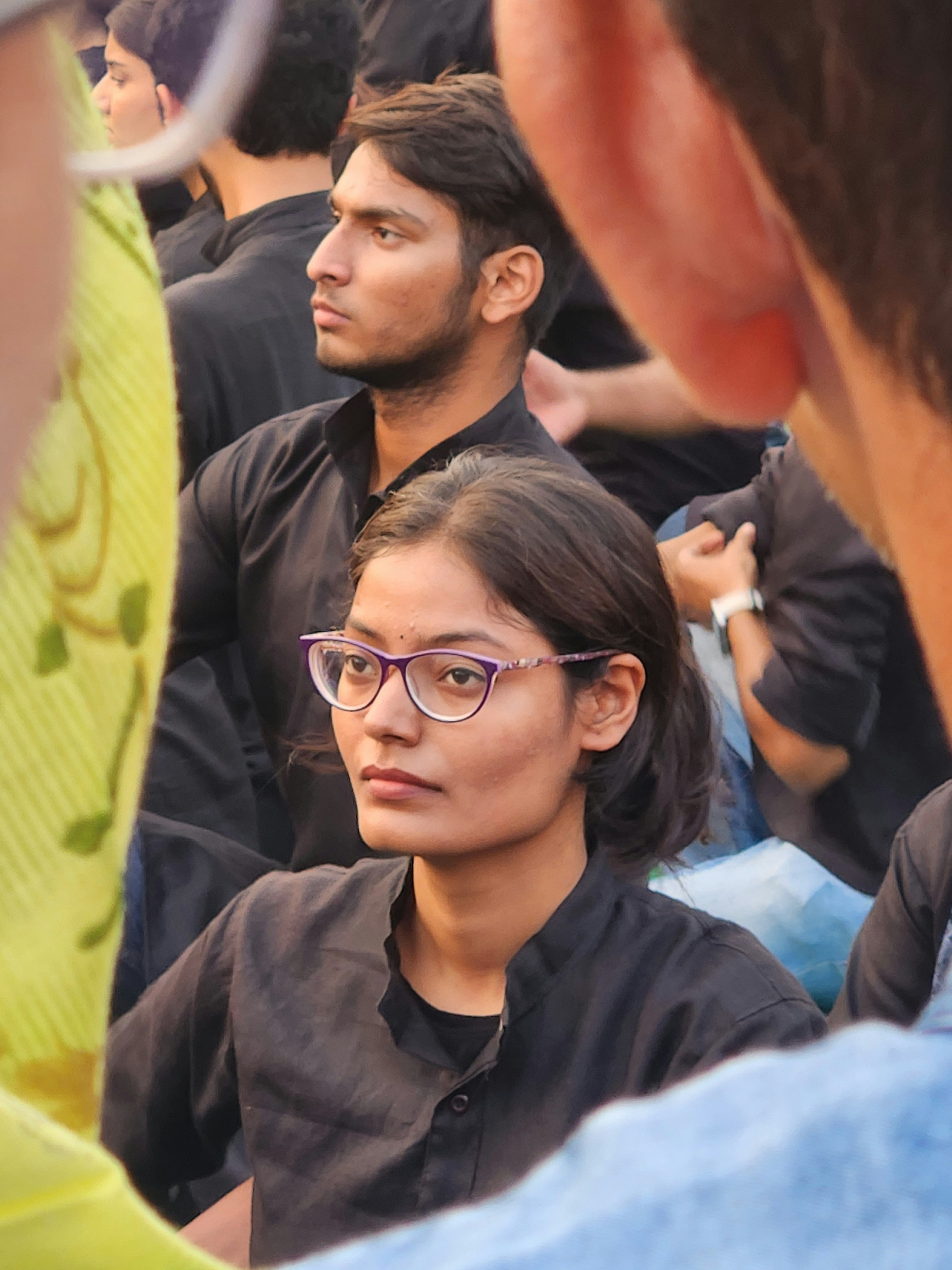 A group of people sitting next to each other photo – Free Human Image ...