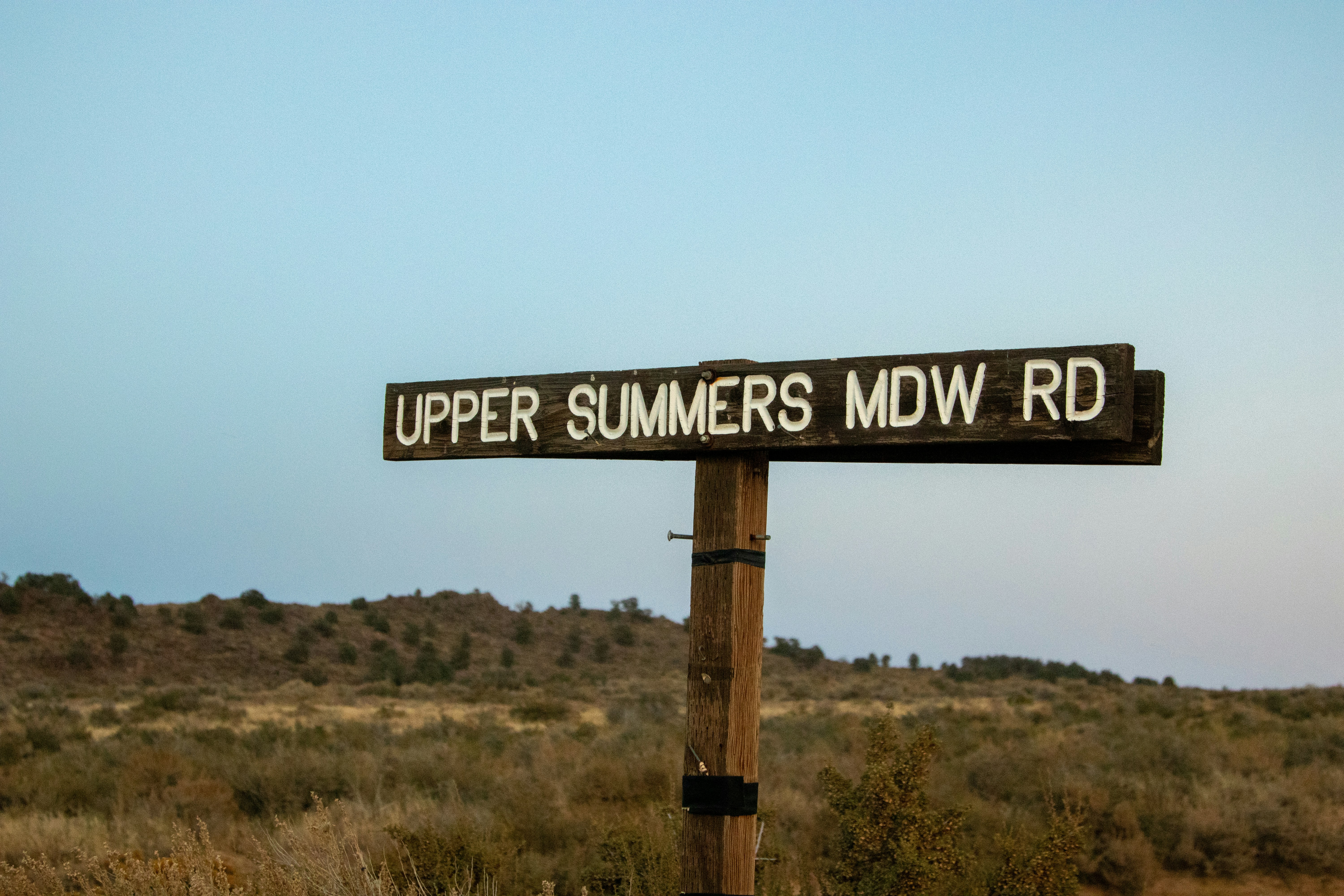 Desert Road Sign in Morning Light