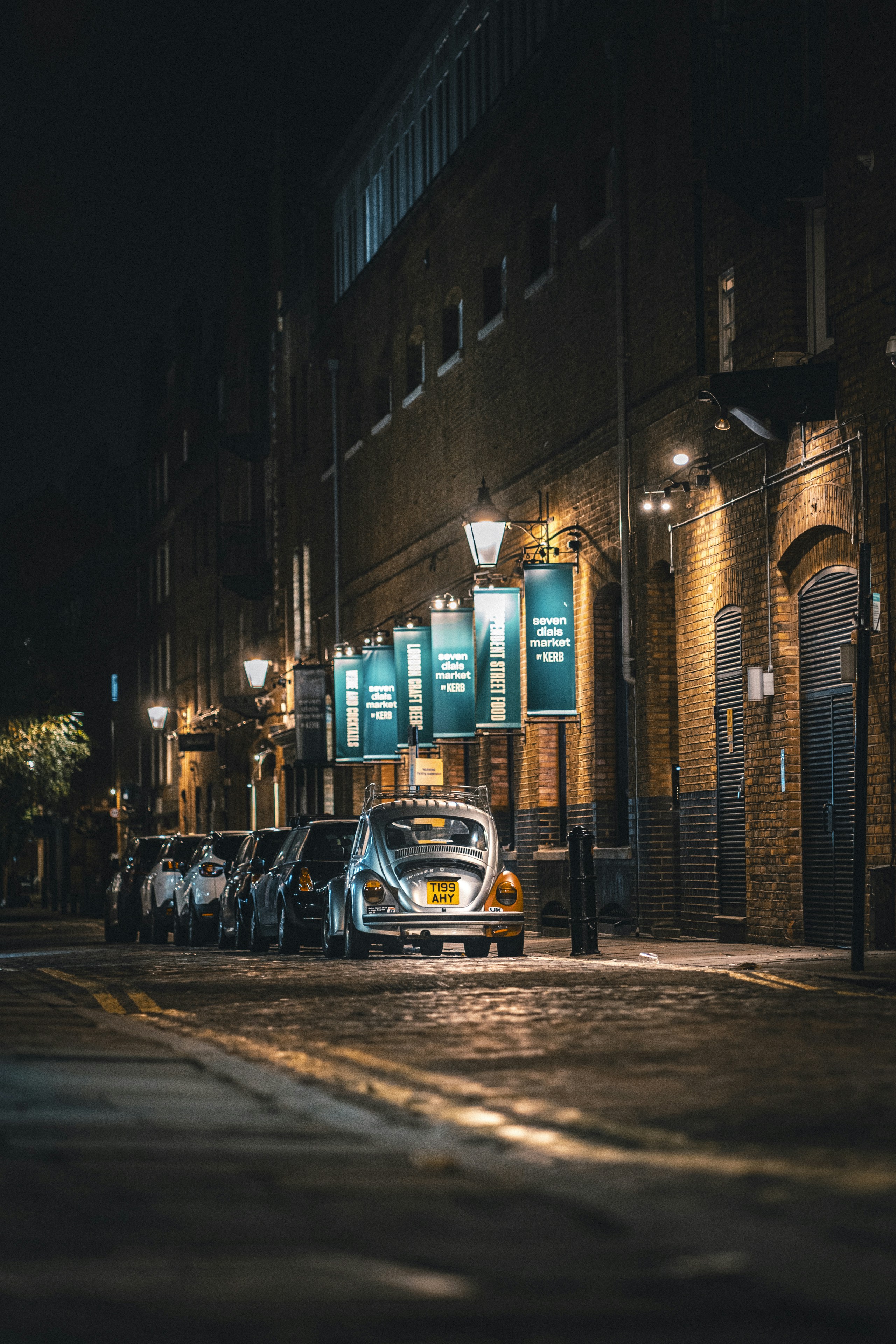 Night Street Choir: Neon Banners and Classic Cars