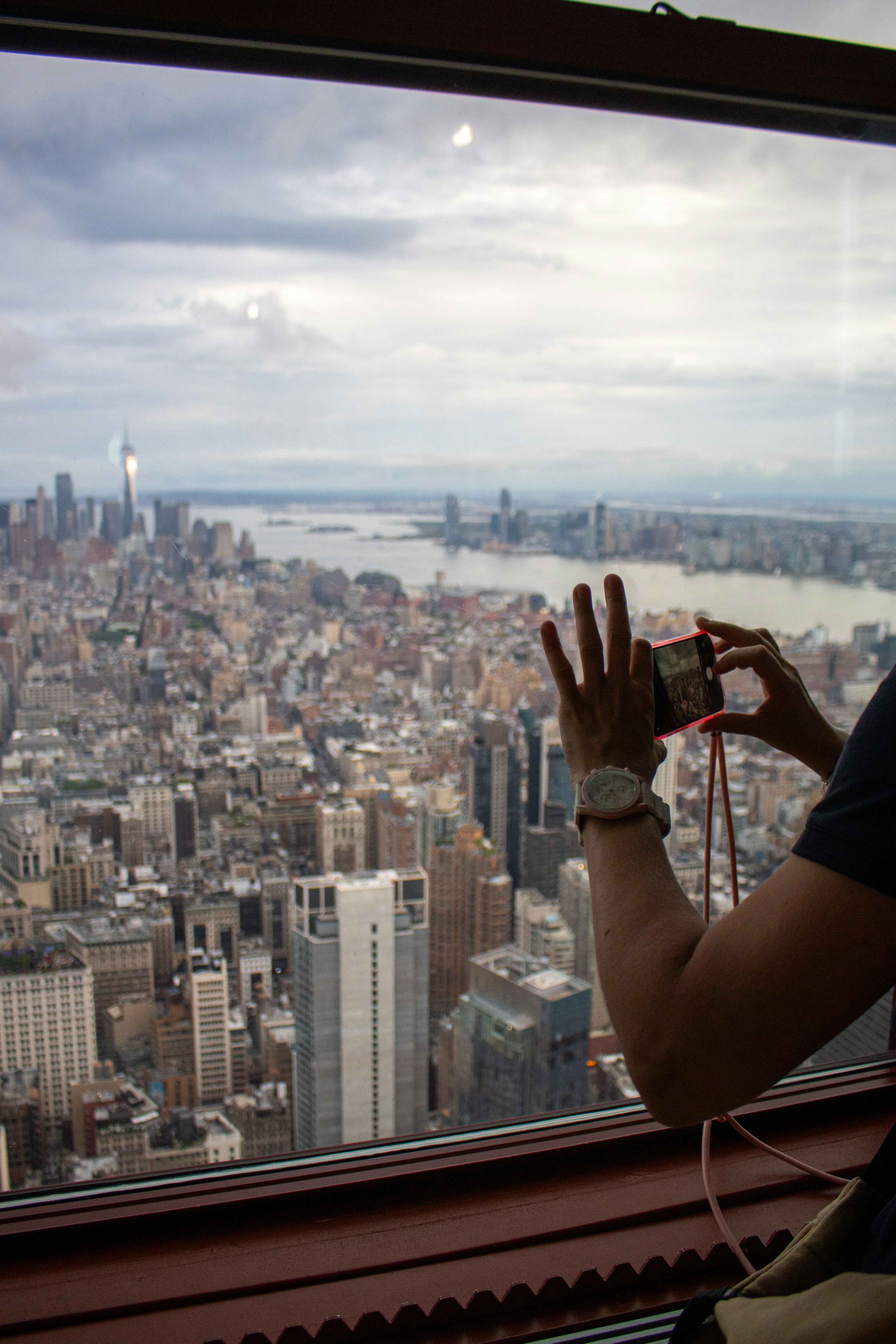 Taken in the Sky-High Window: Cityscape and a Handheld Moment