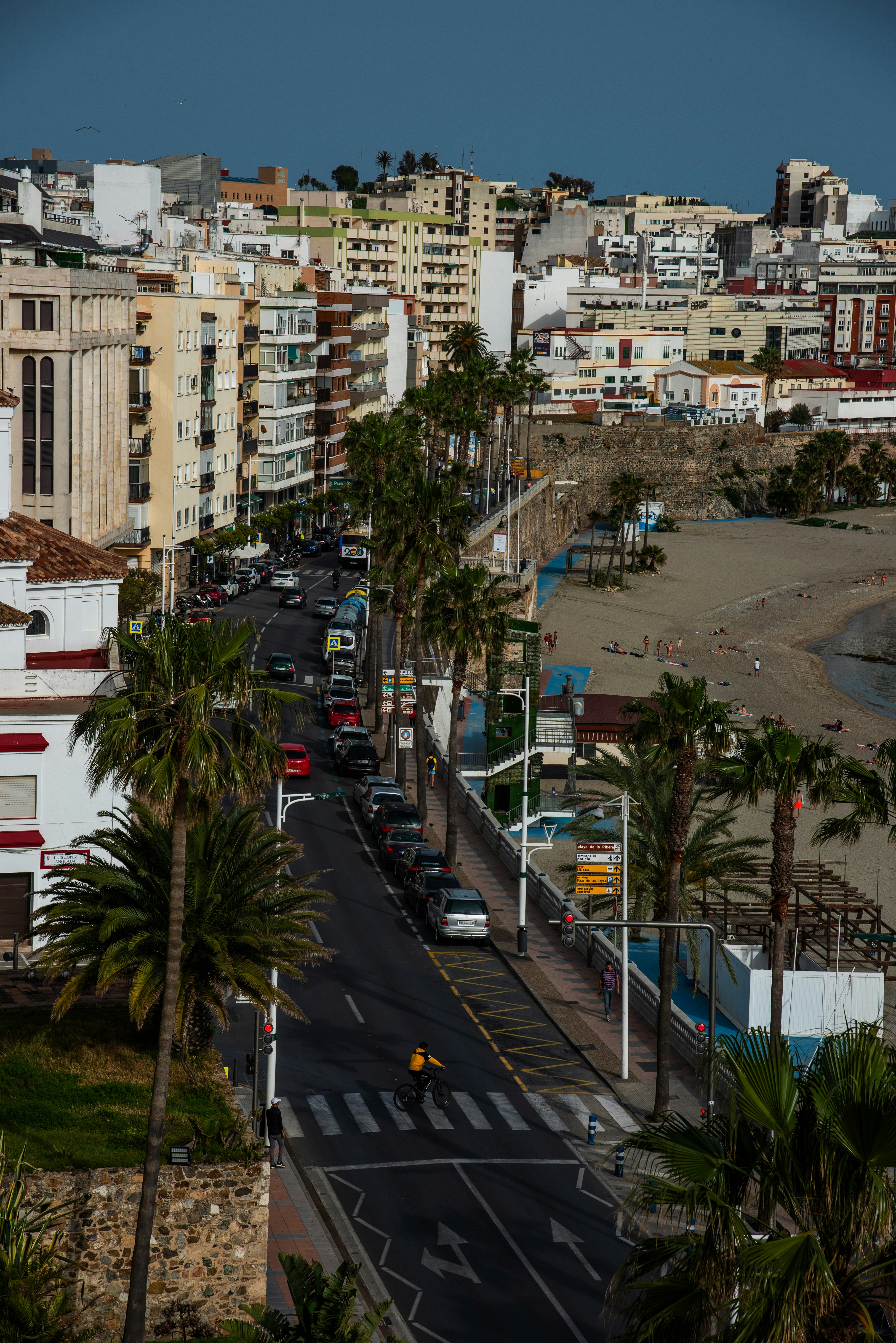 A view of a city with palm trees and a beach photo – Free Ceuta Image ...