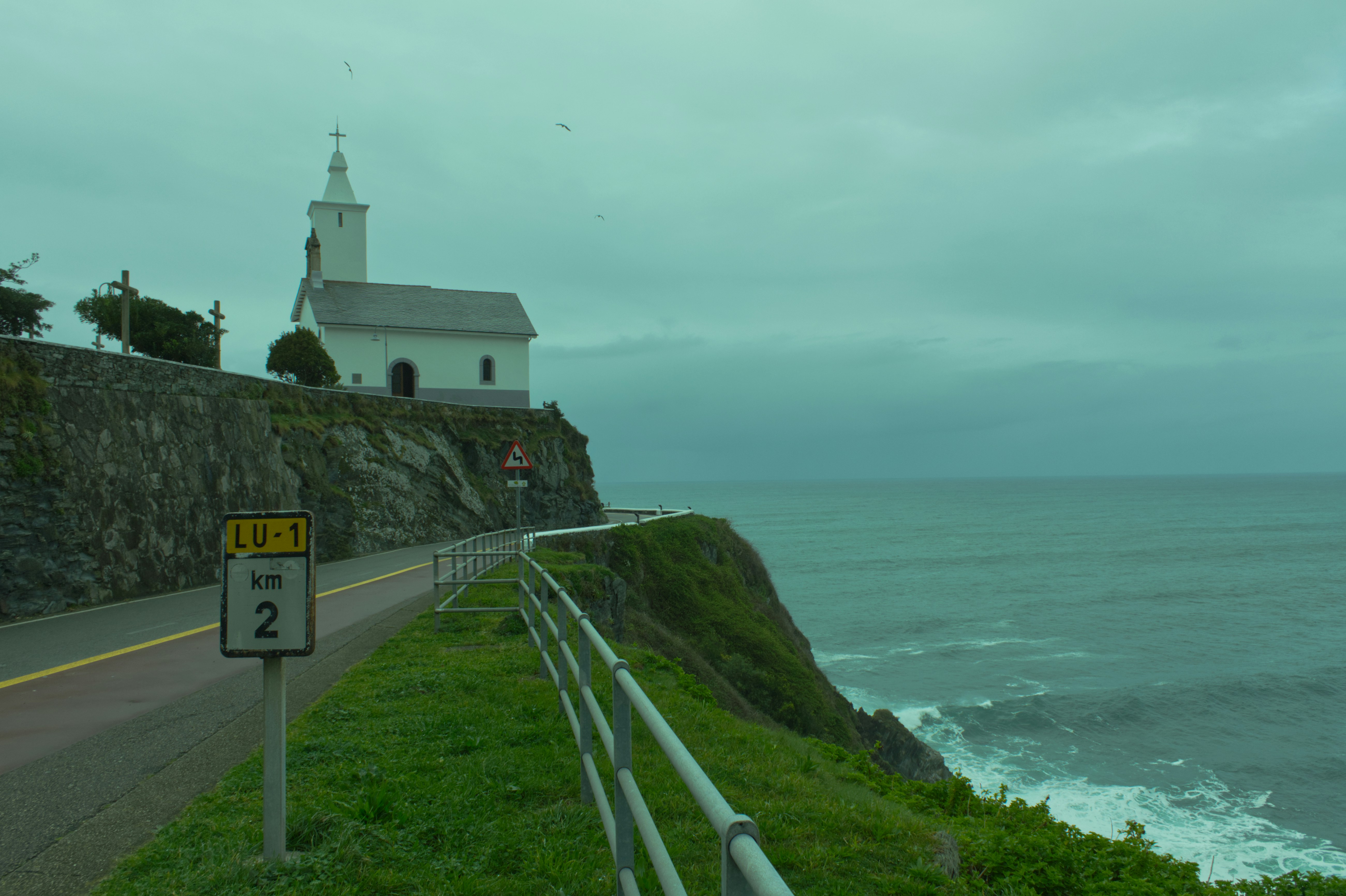 Cliffside Chapel and the Winding Coastal Road