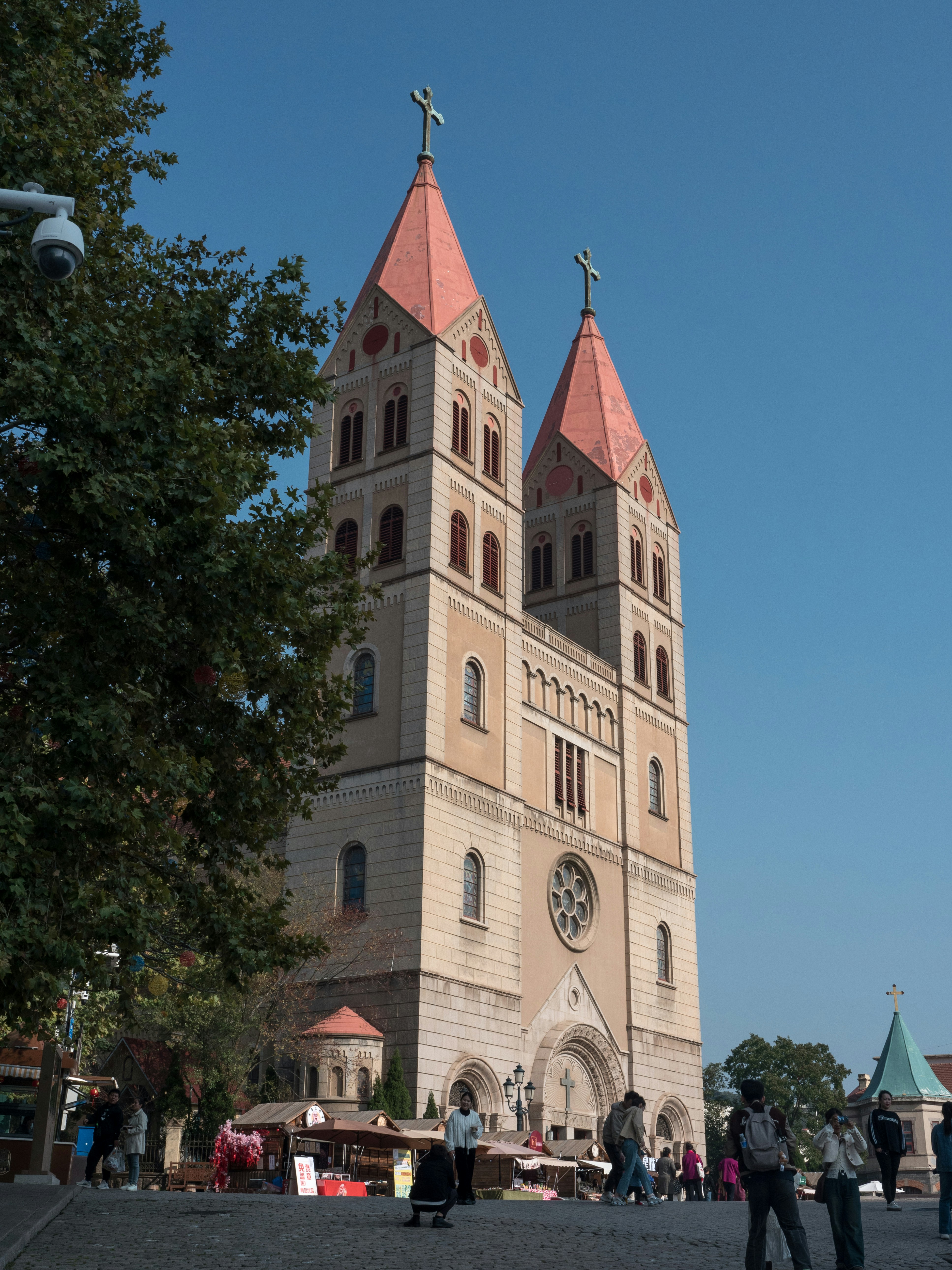A large church with two towers and a cross on top photo – Free Arch ...