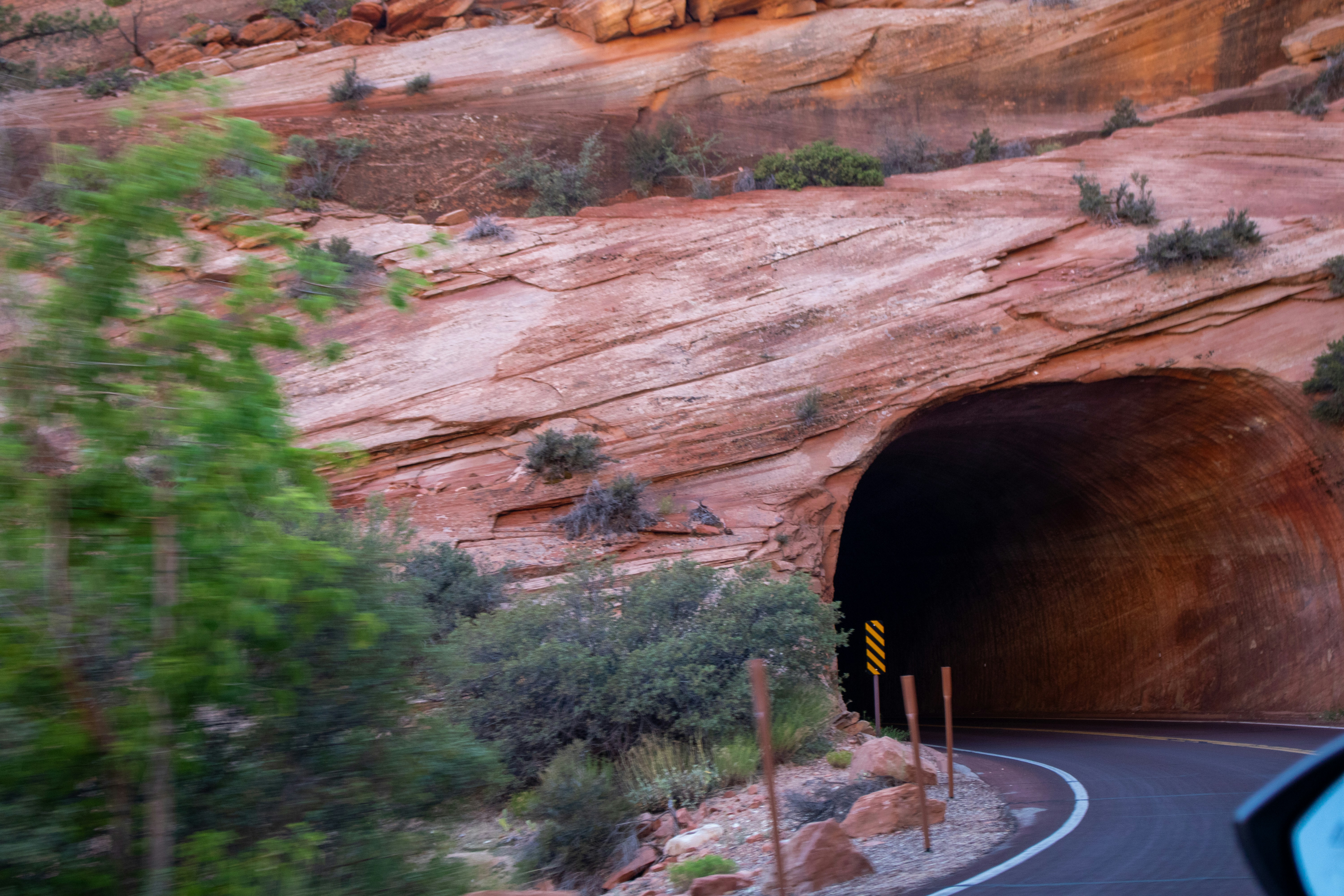 Photo taken from a moving car of the Zion Tunnel