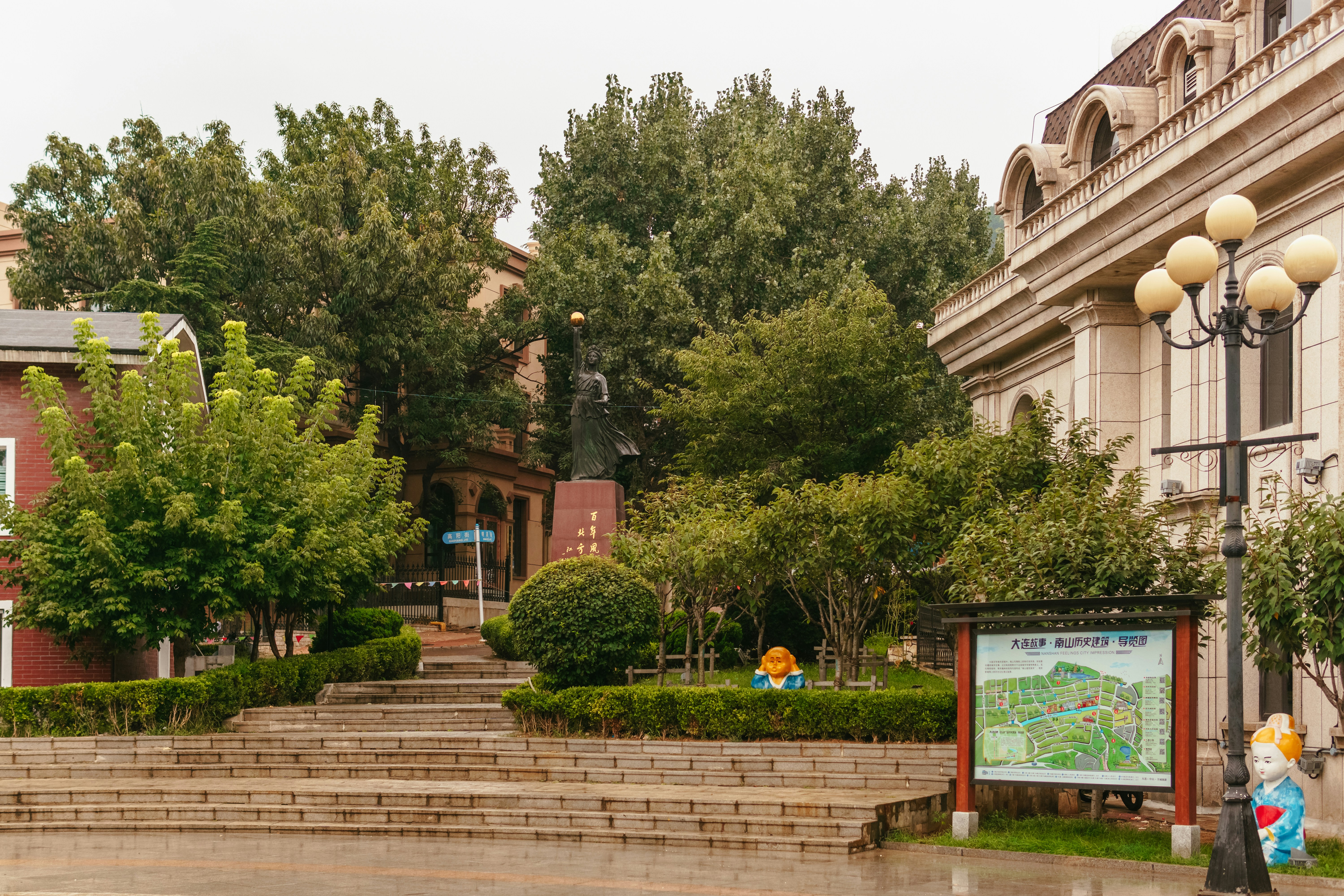 A street scene with focus on the steps leading up to a building photo ...