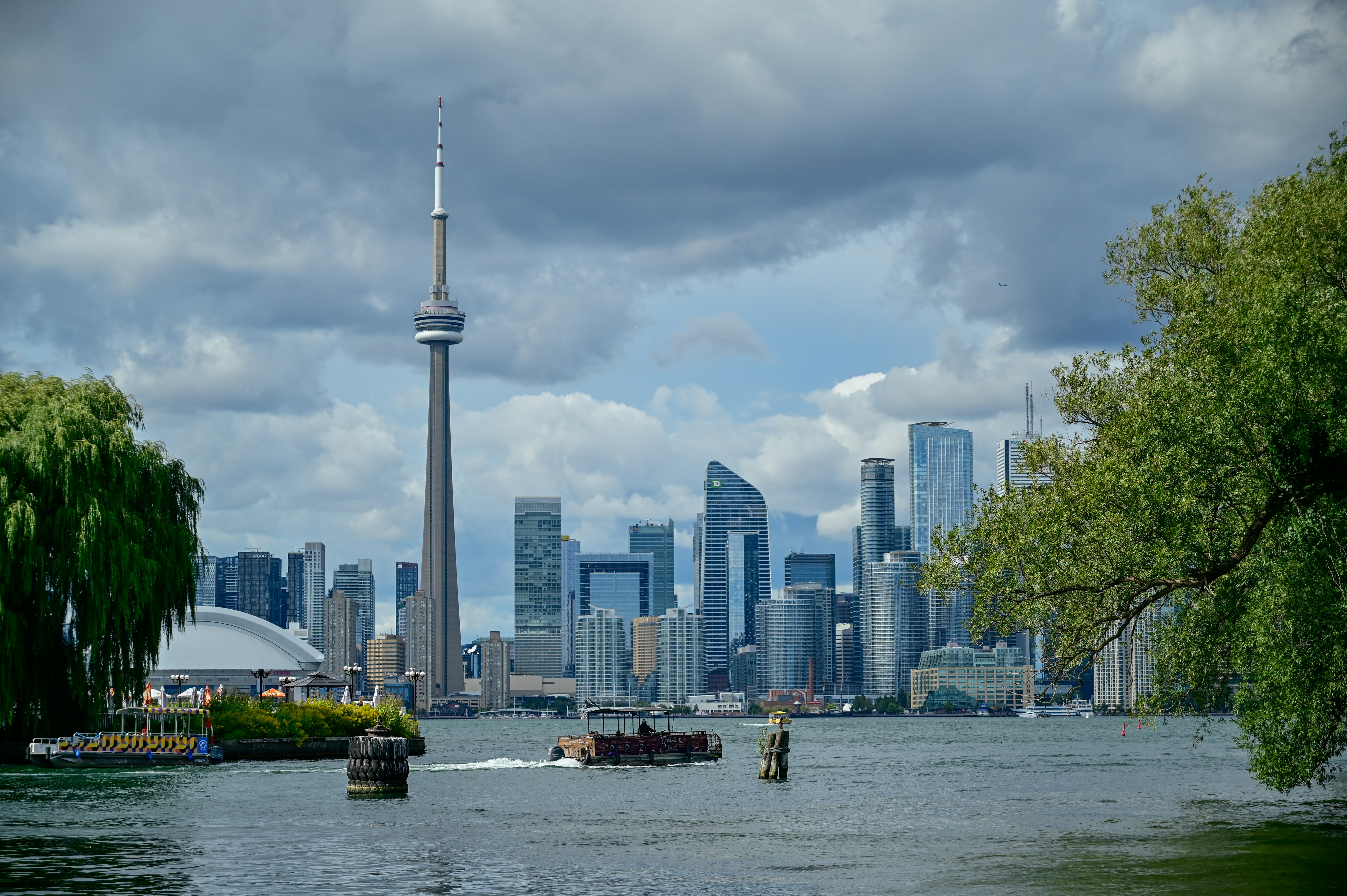 Towering Skyline Over Still Waters