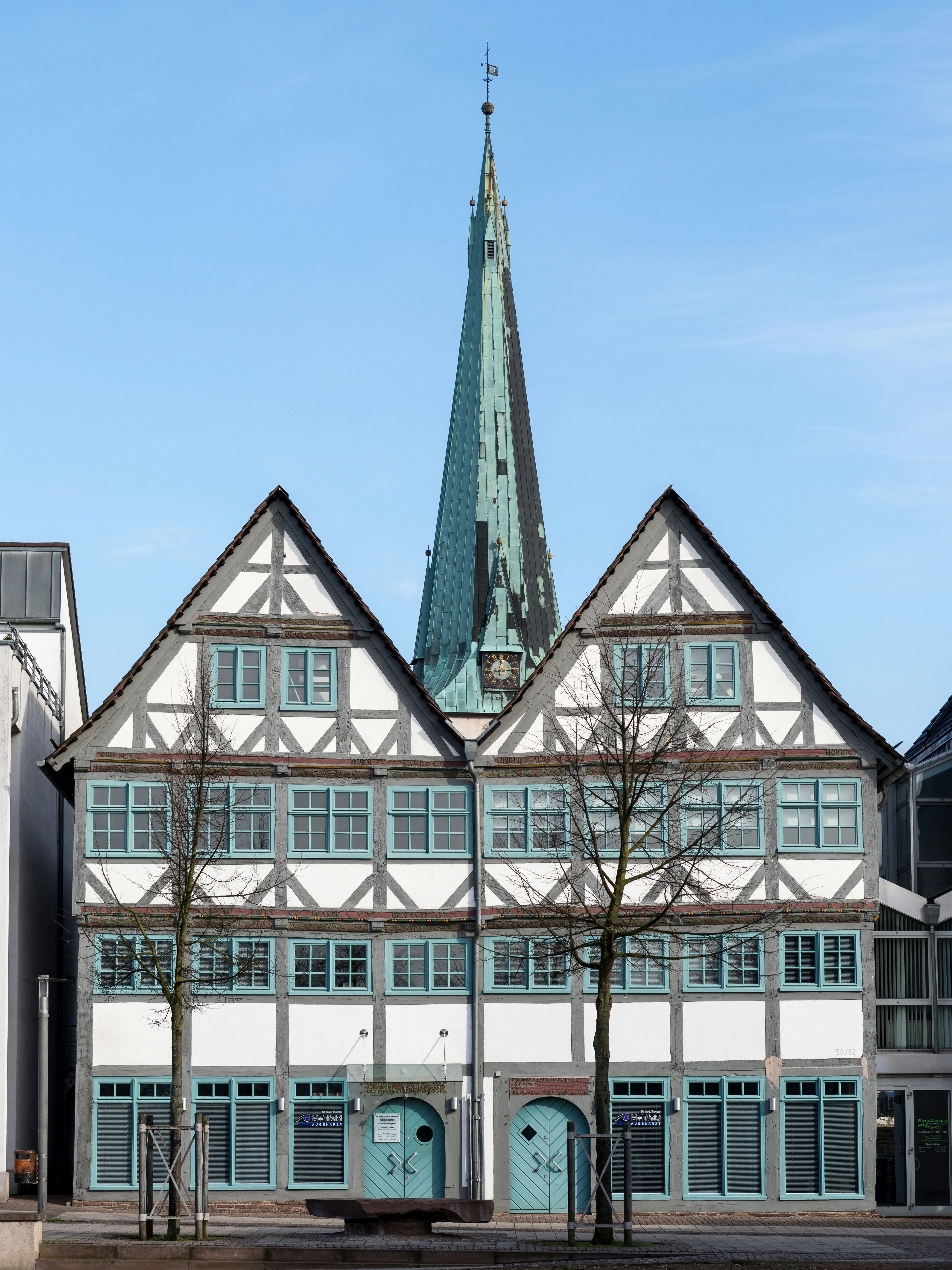 A large building with a steeple on top of it photo – Free Skyline Image ...