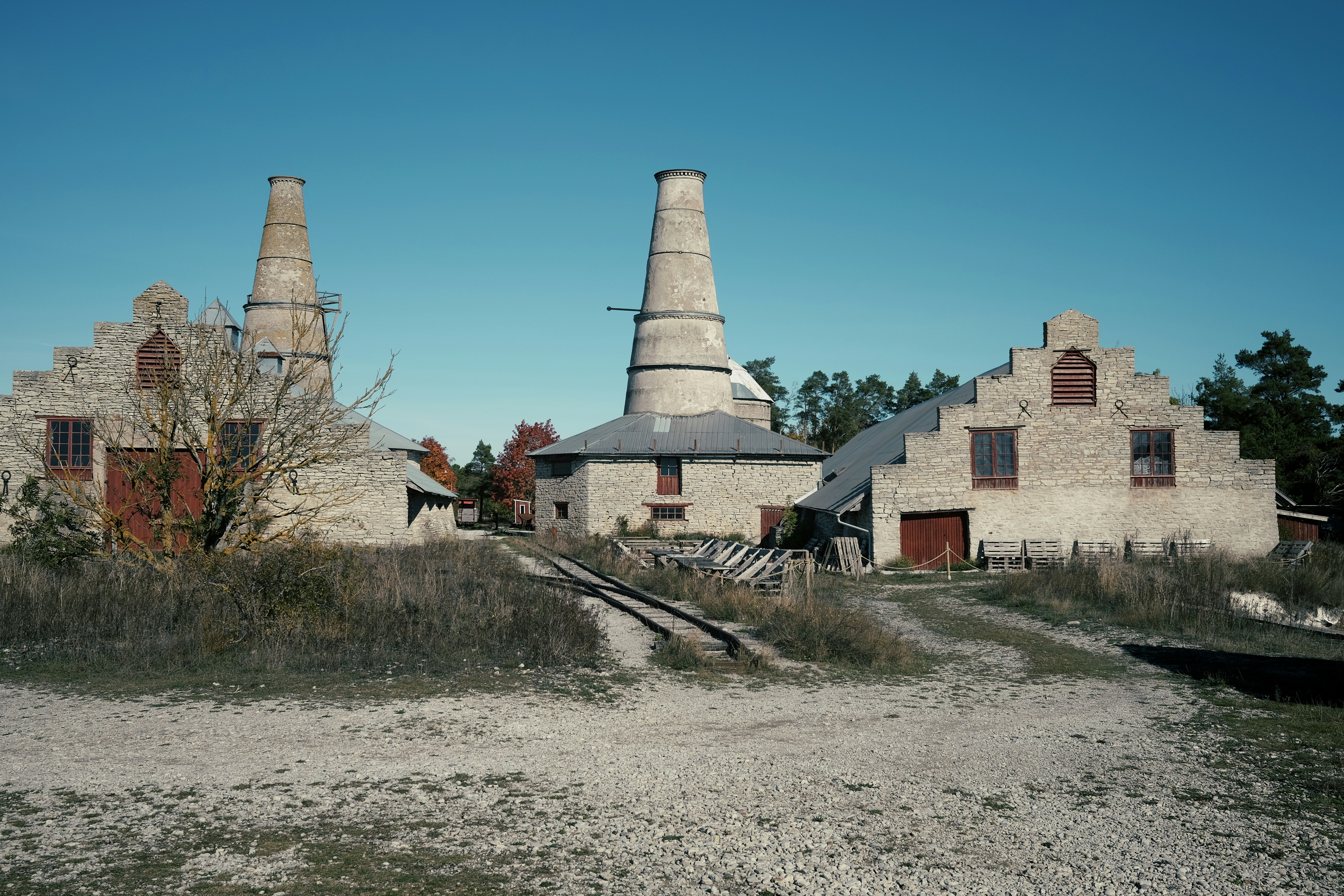 Central Lime Kiln Towers Framing a Quiet Brick Industrial Complex