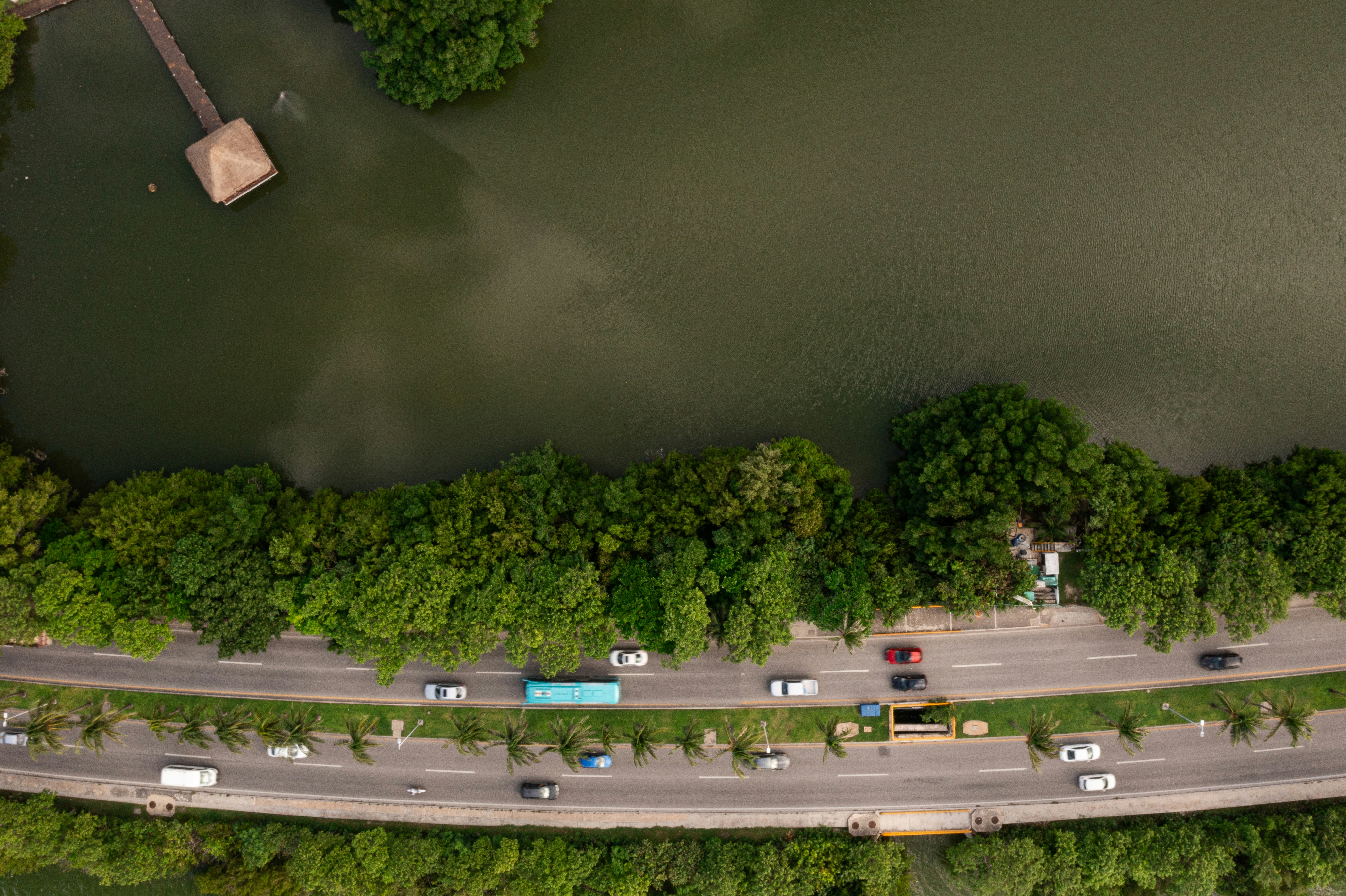 An aerial view of a road and a river photo – Free Street Image on Unsplash