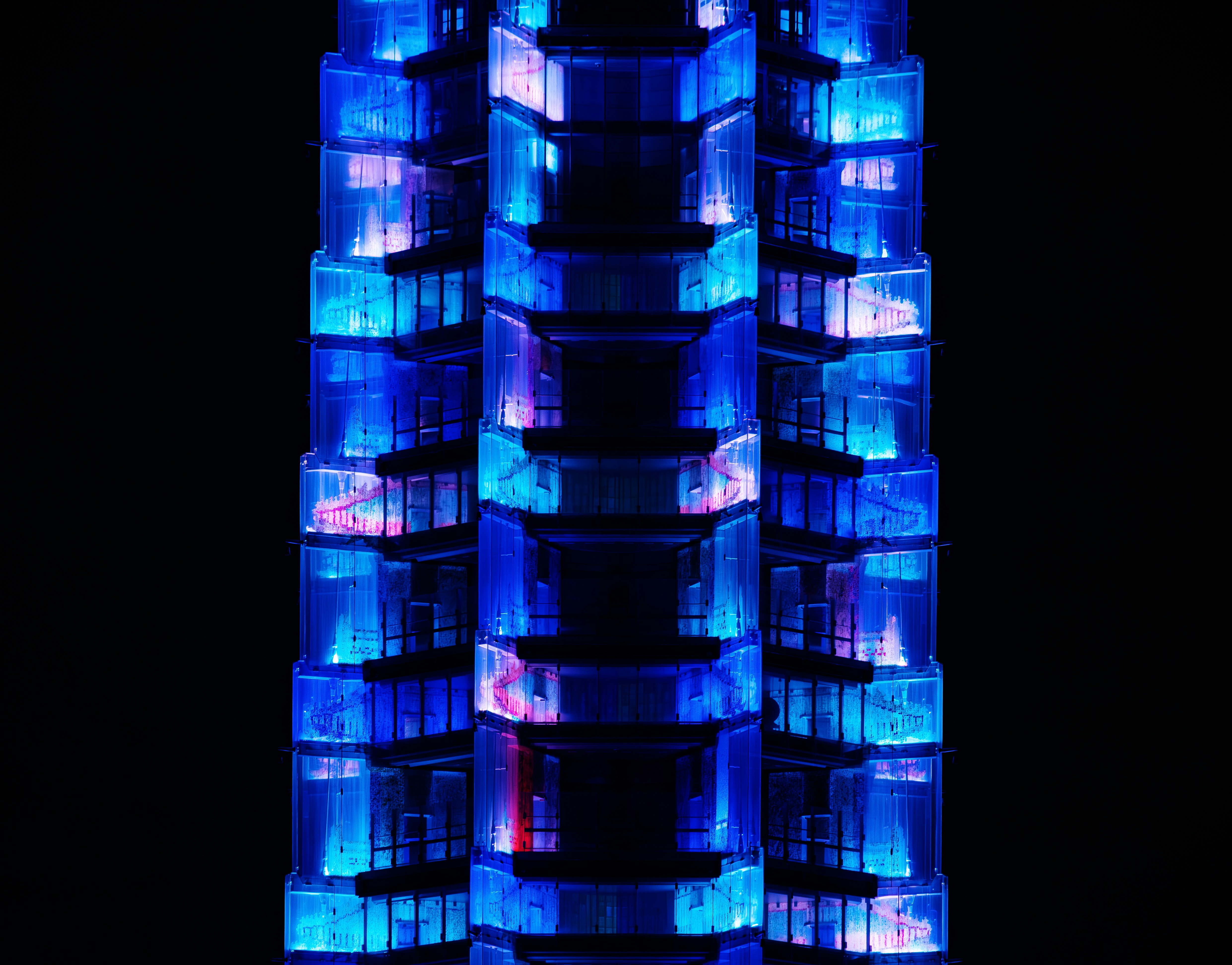 Azure Prism: Night Portrait of a Glass-Clad Tower