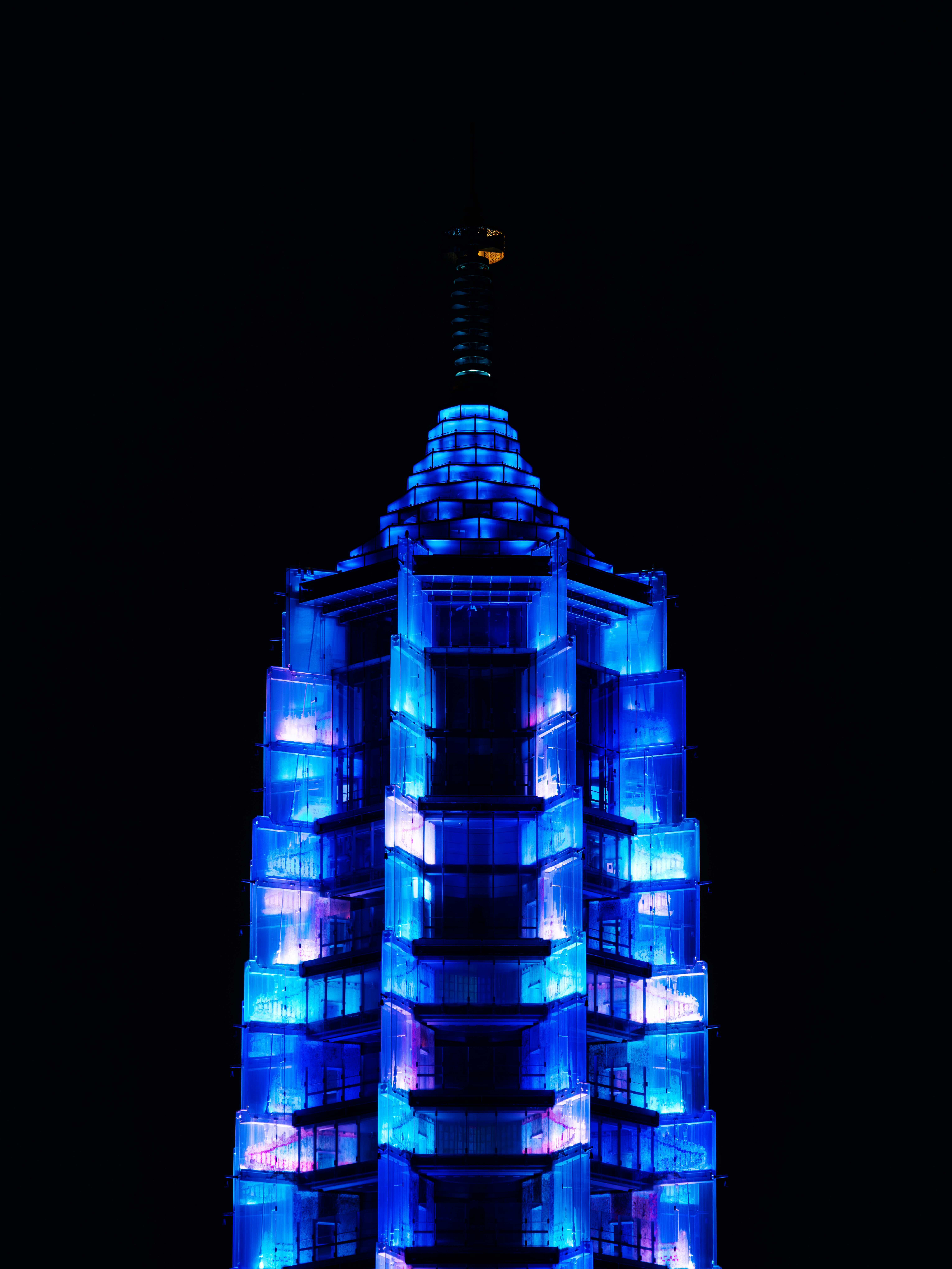 A tall tower with a clock on top of it photo – Free Porcelain tower of ...