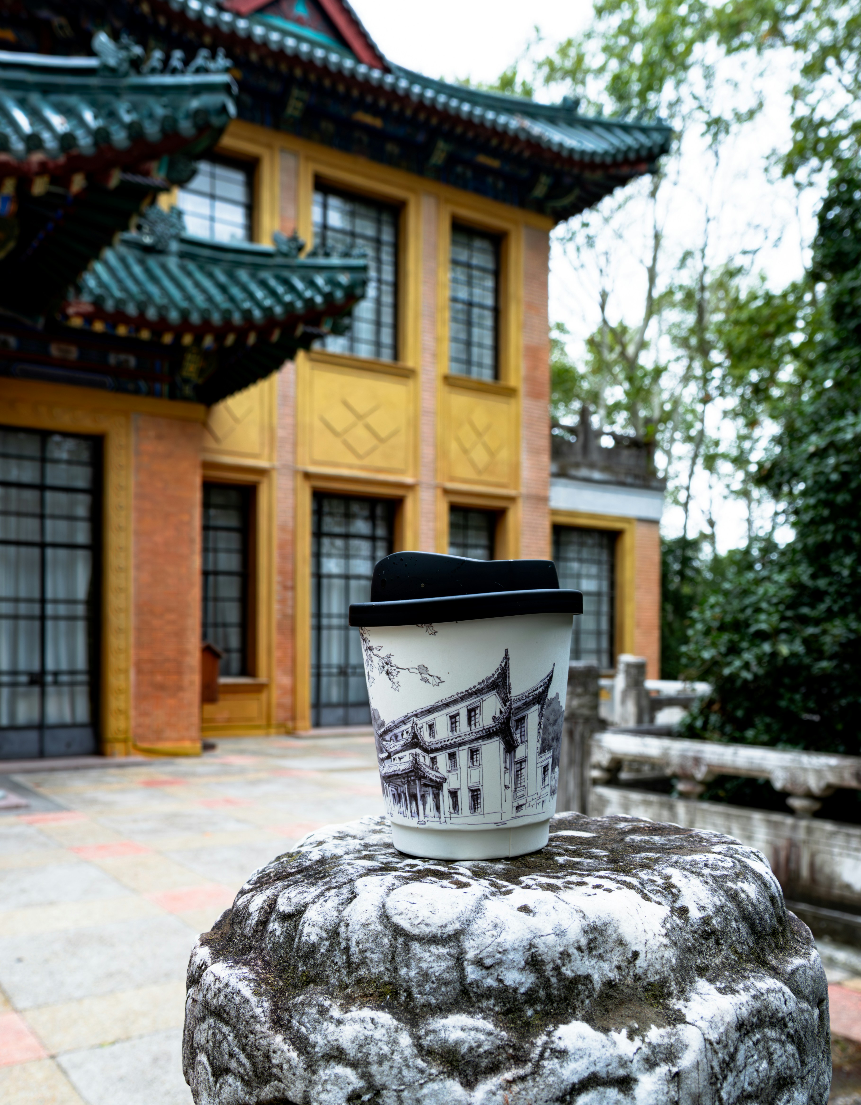 Ink-Lined Cup Anchors a Temple Courtyard Moment