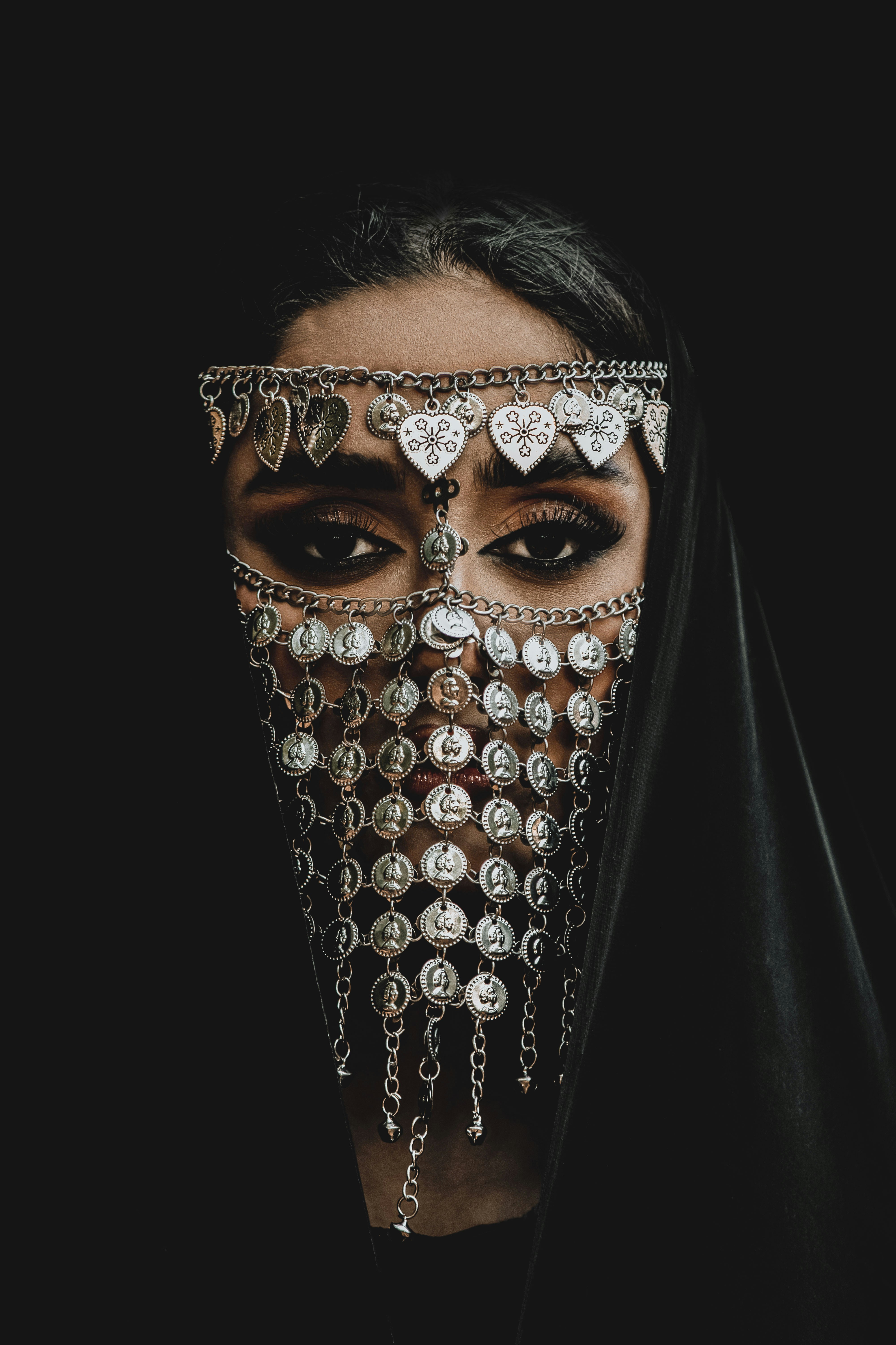 A woman wearing a veil and a face mask photo – Free Hamedan Image on ...