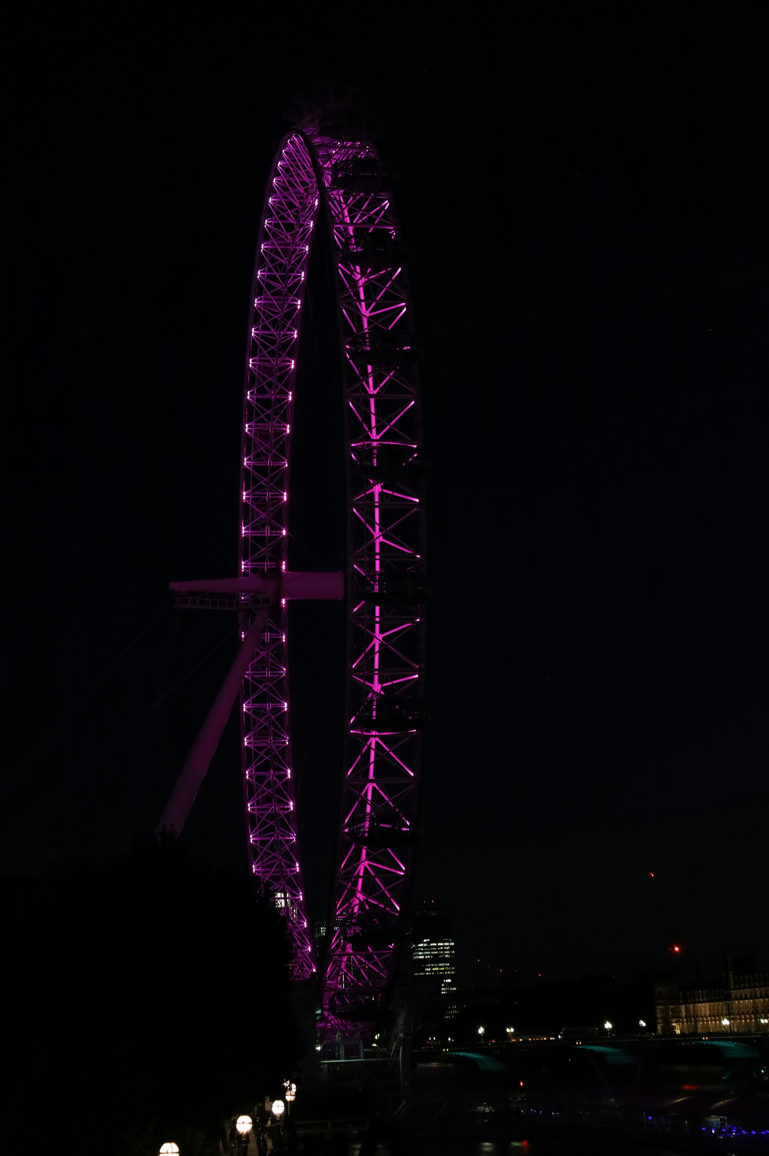 Amethyst Orbit: Night Glint on a Purple Ferris Wheel