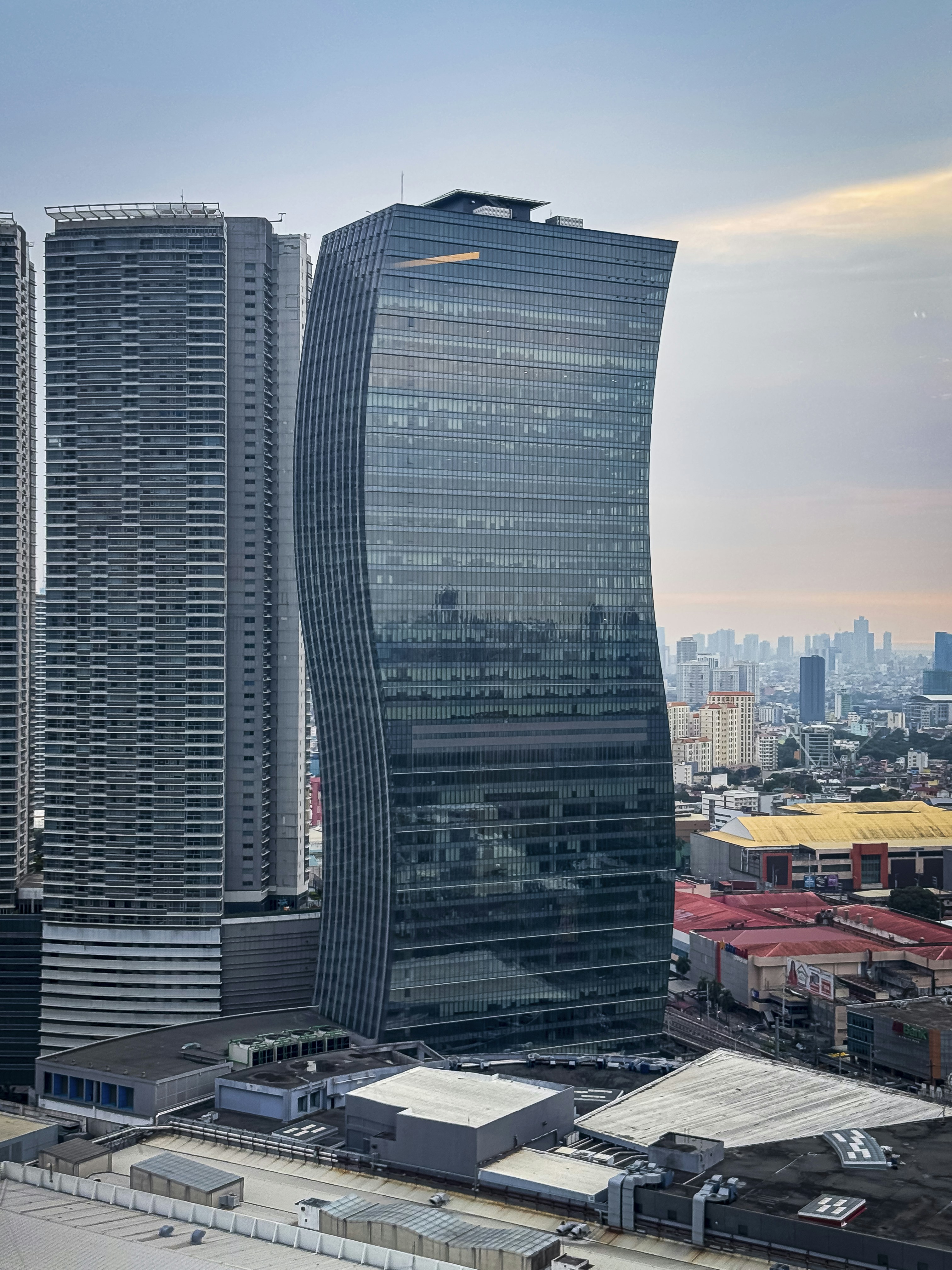 A group of tall buildings sitting next to each other photo – Free Urban ...