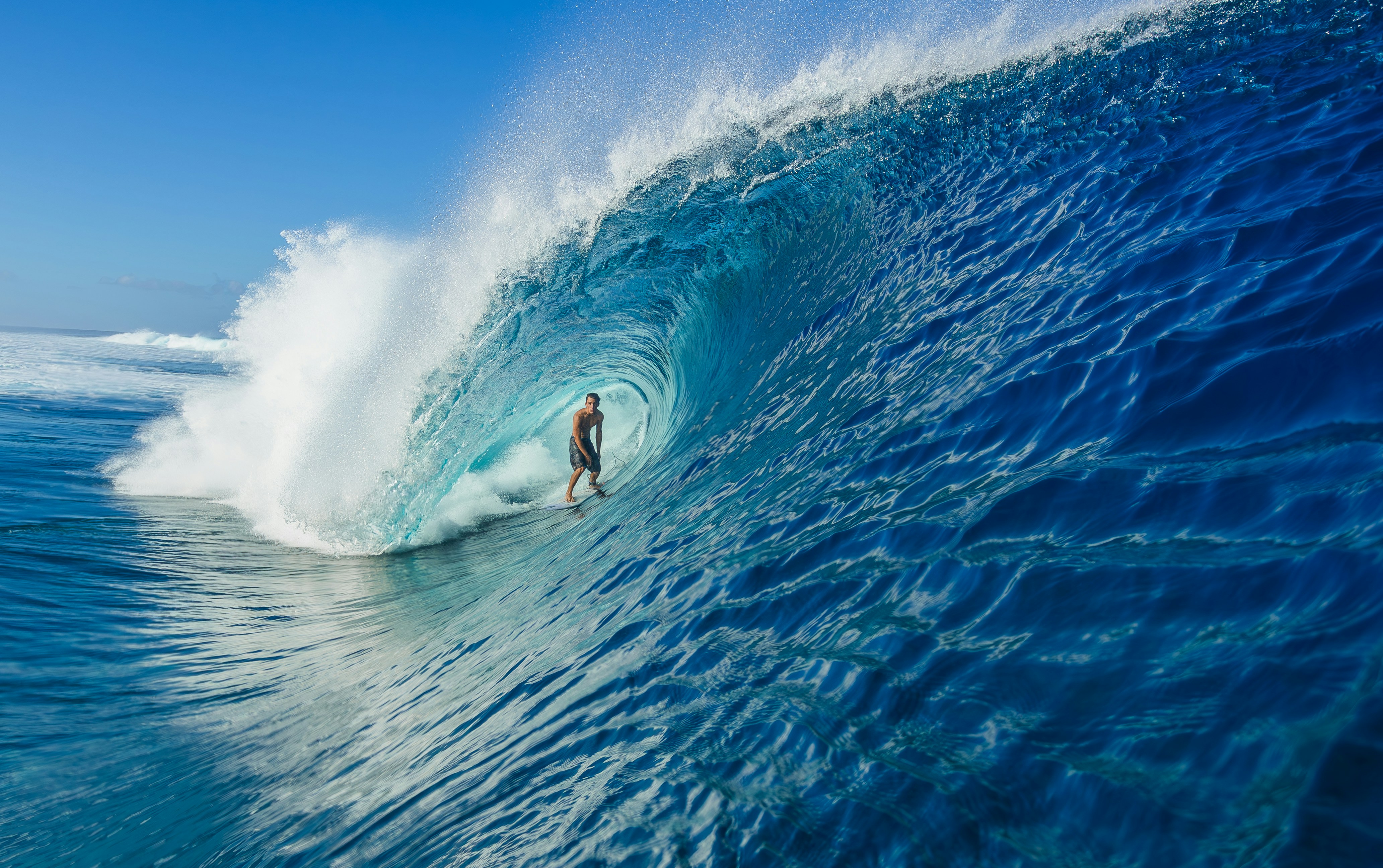 A man riding a wave on top of a surfboard photo – Free Tahiti Image on ...