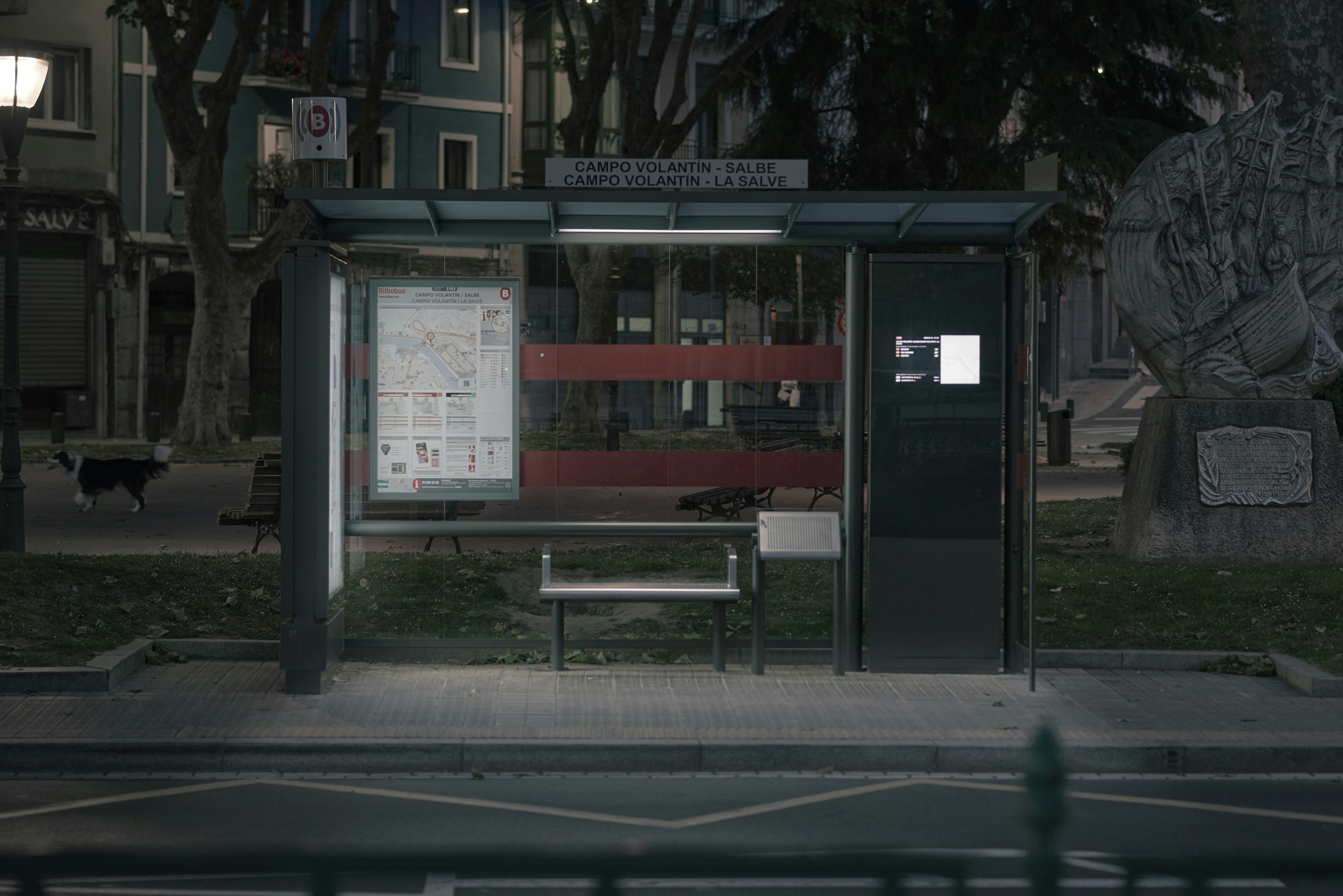 A bus stop sitting on the side of a road photo – Free Bilbao Image on ...