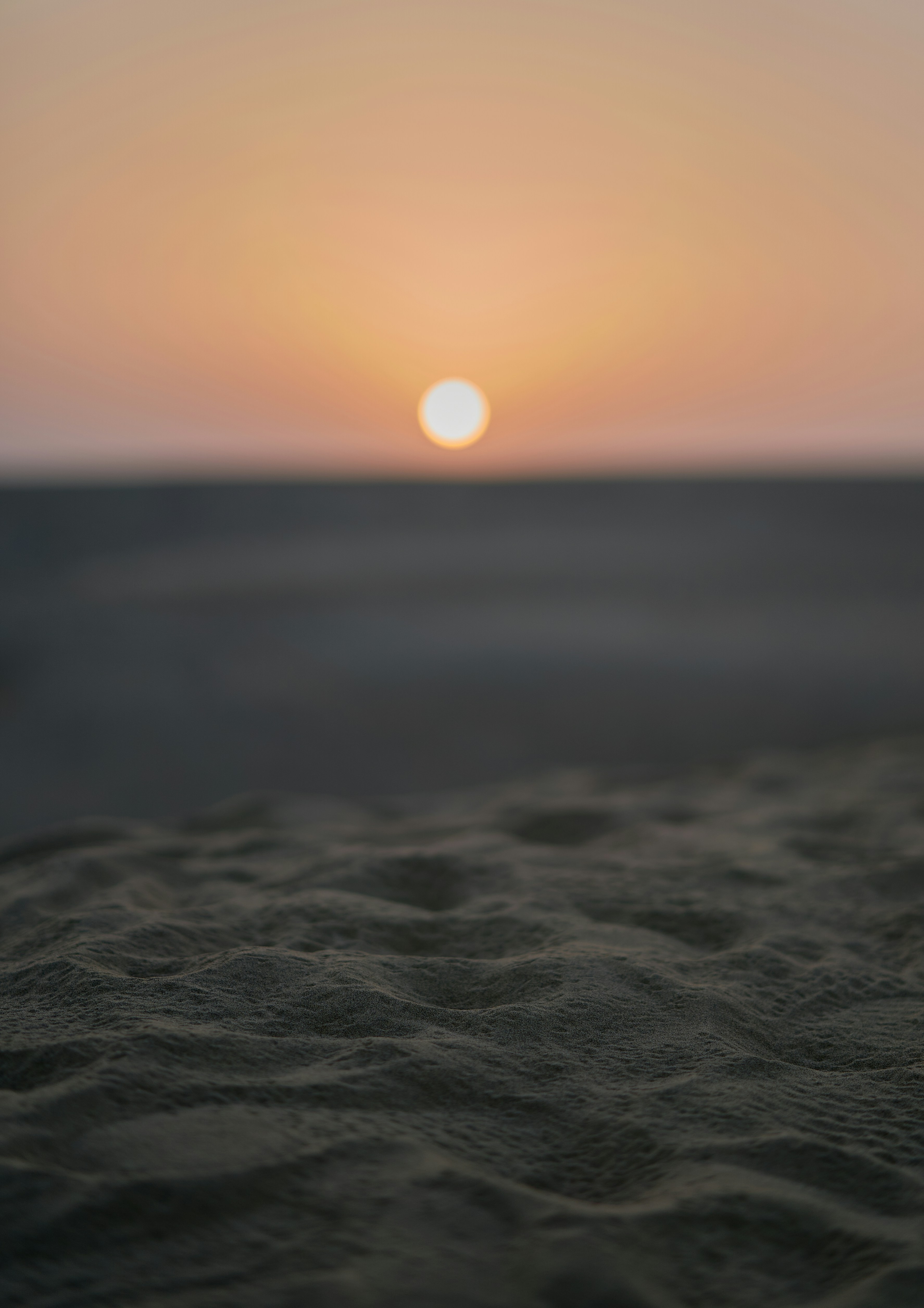 Ember Horizon Over Wind-Sculpted Dunes at Dusk