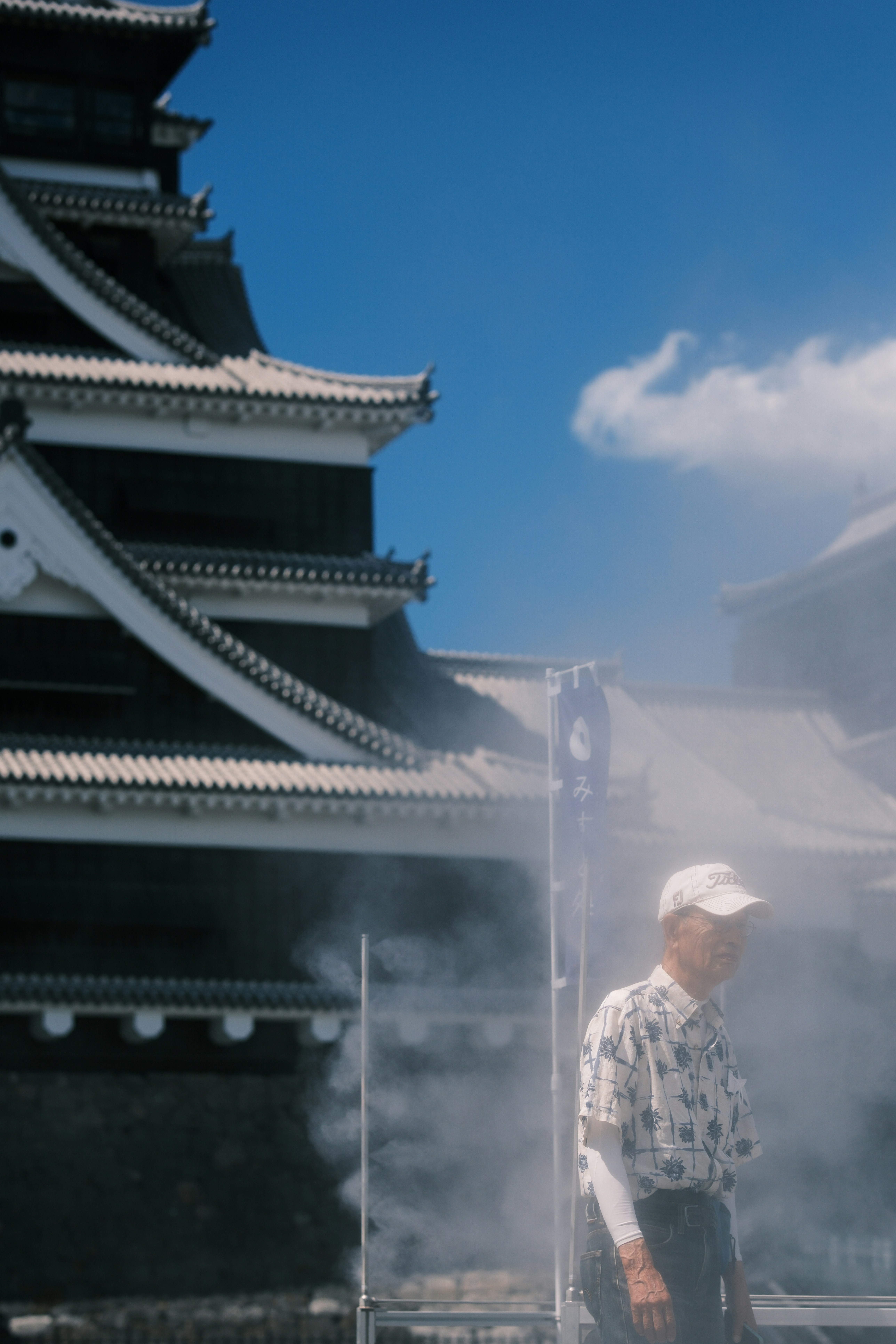 Smoke and Stone: A Quiet Portrait at the Castle Gate