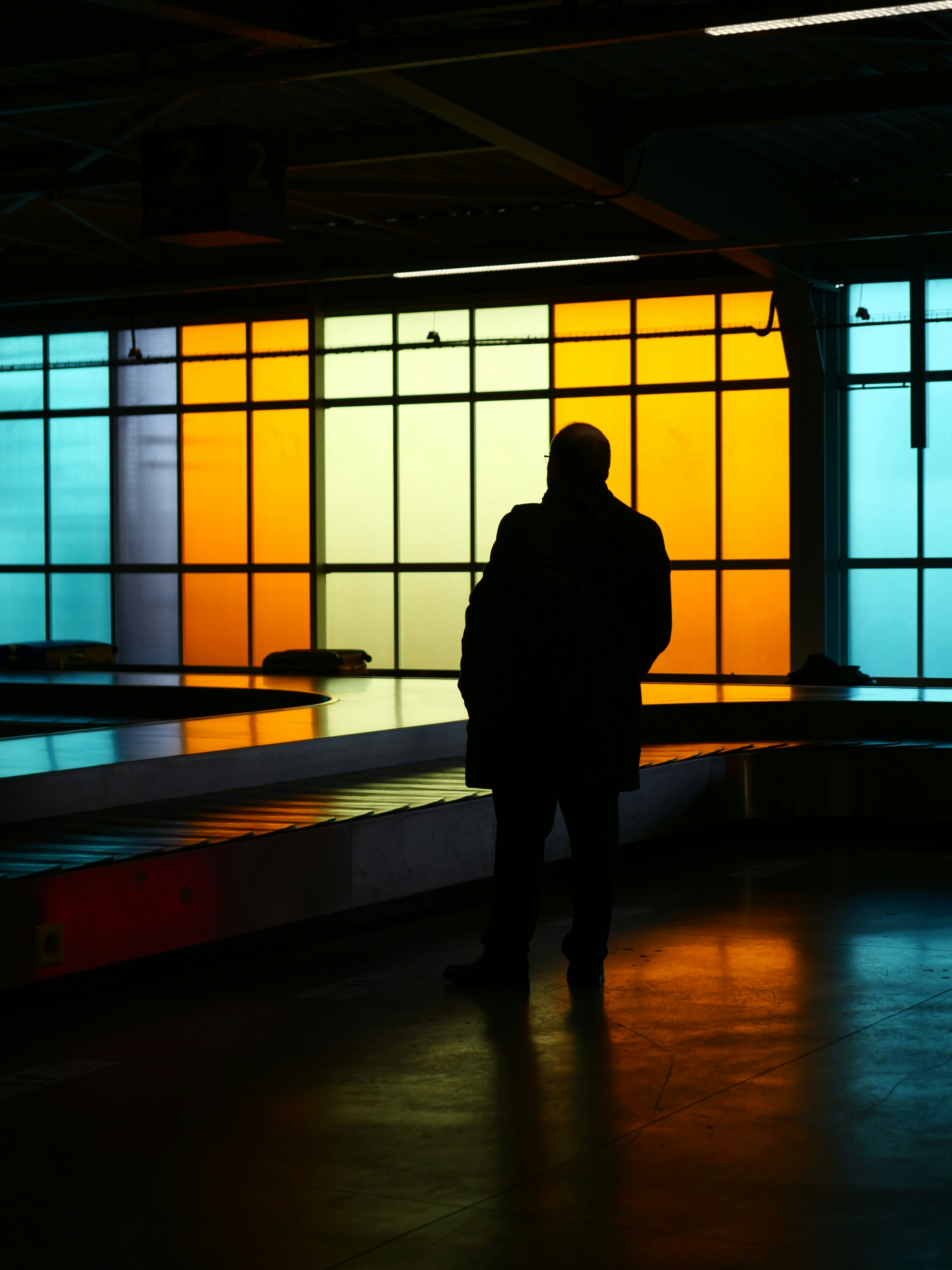 A person standing in front of a large window photo – Free Marignane ...