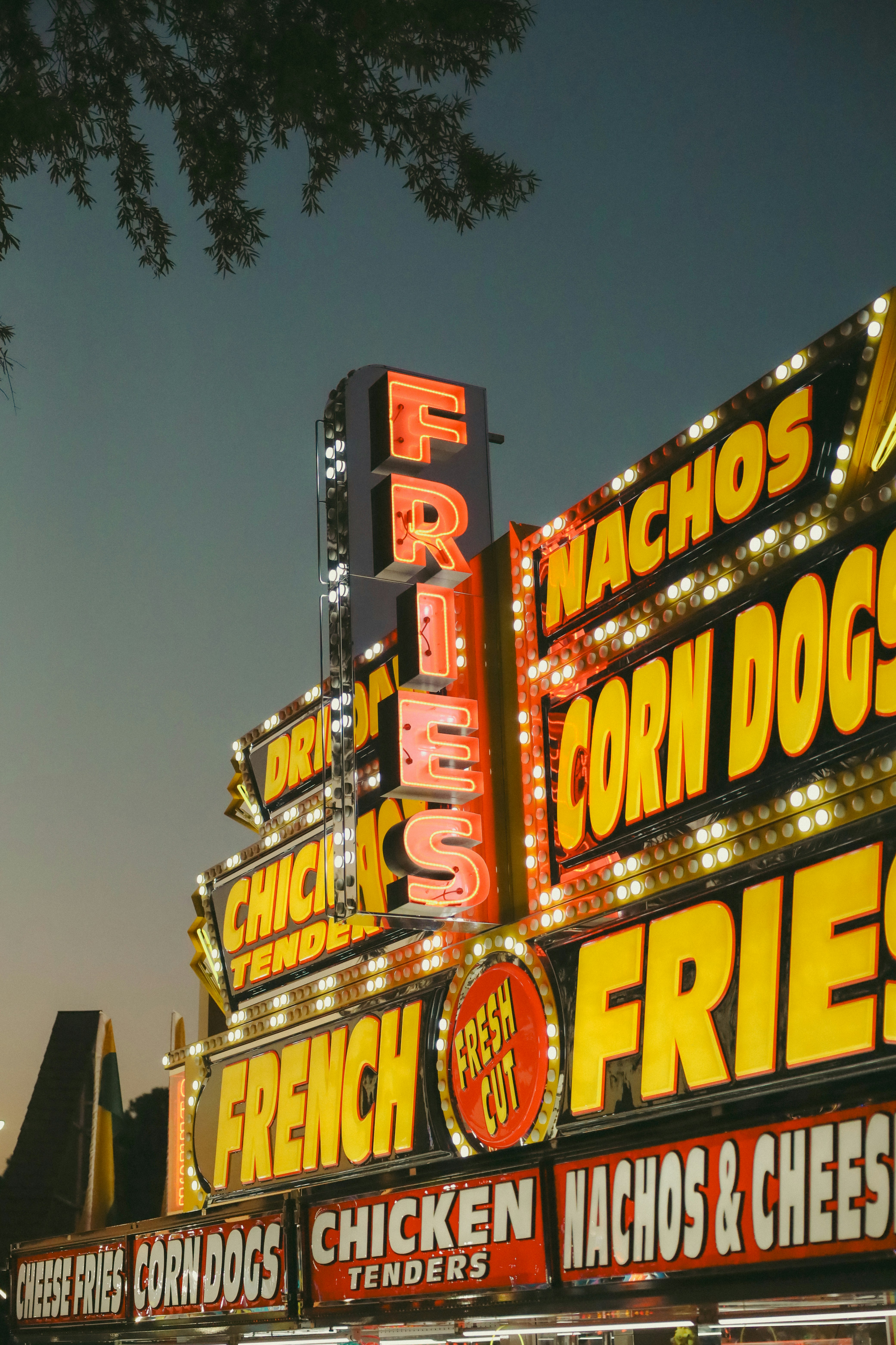 Neon-Signed Night Market: Fries, Nachos, and Corn Dogs in Lights