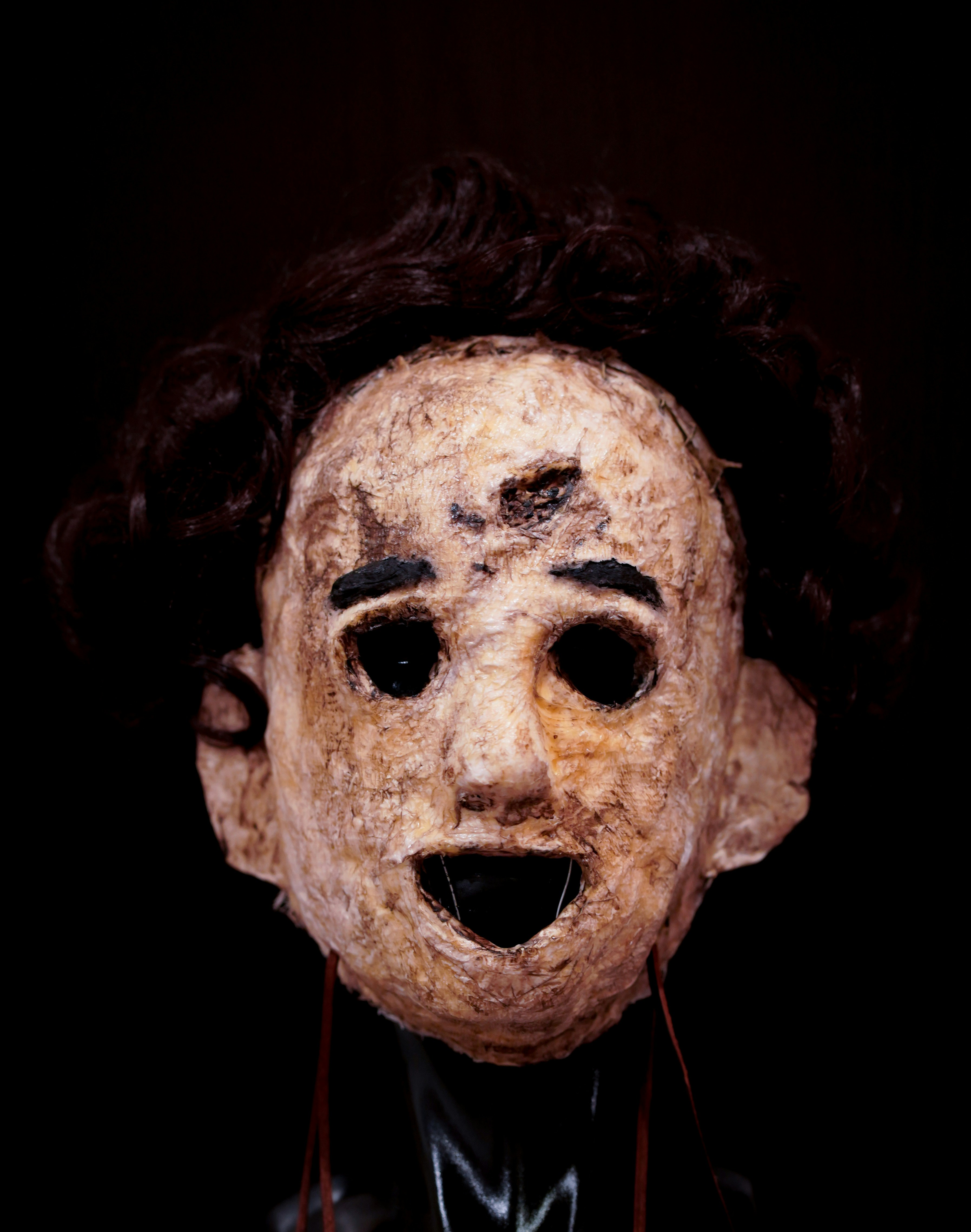 A creepy looking mask with a black background photo – Free Death mask ...