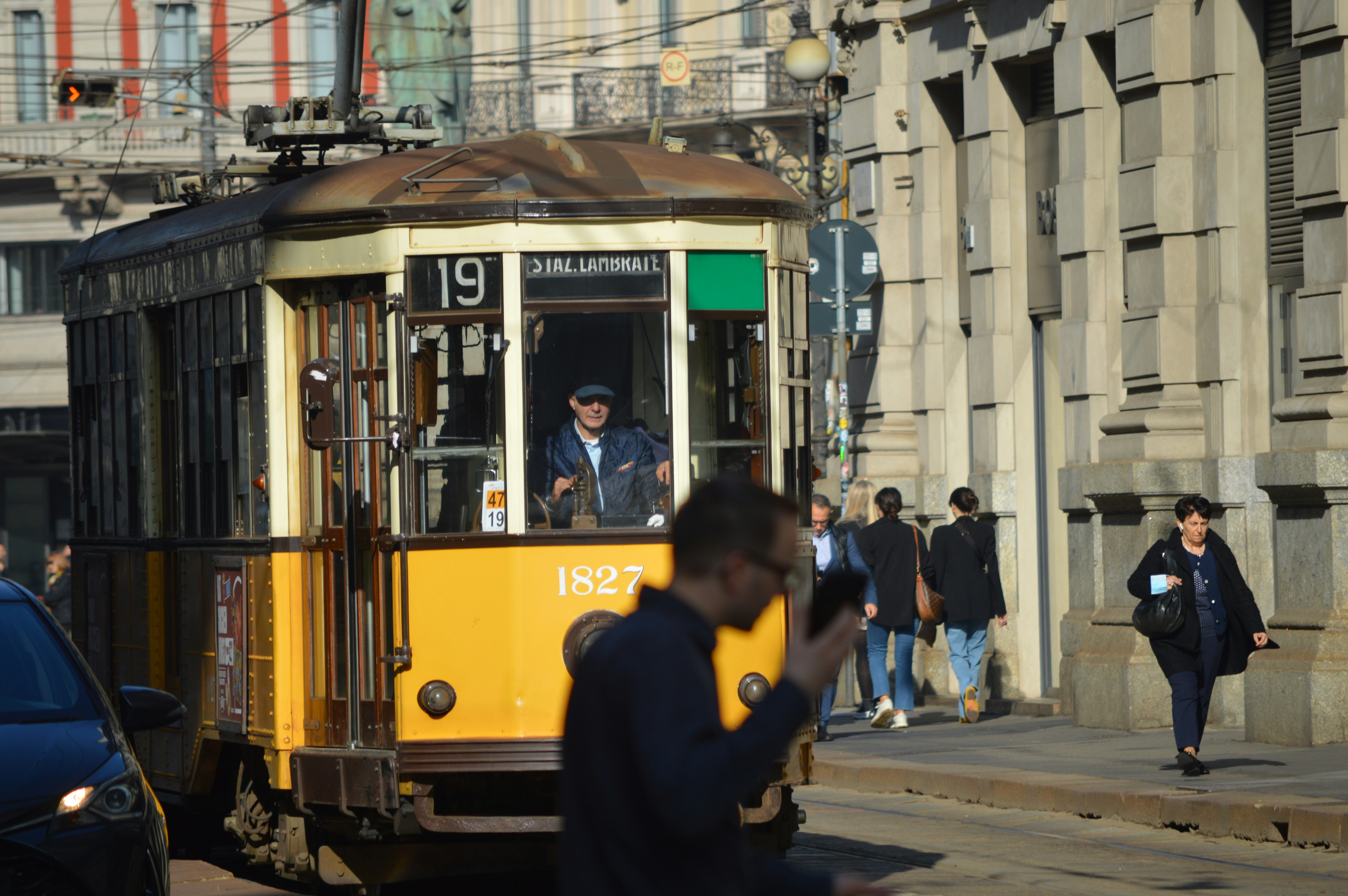 Essence of Milan, Italy, through its bustling streets, These images highlight the city's architectural beauty.