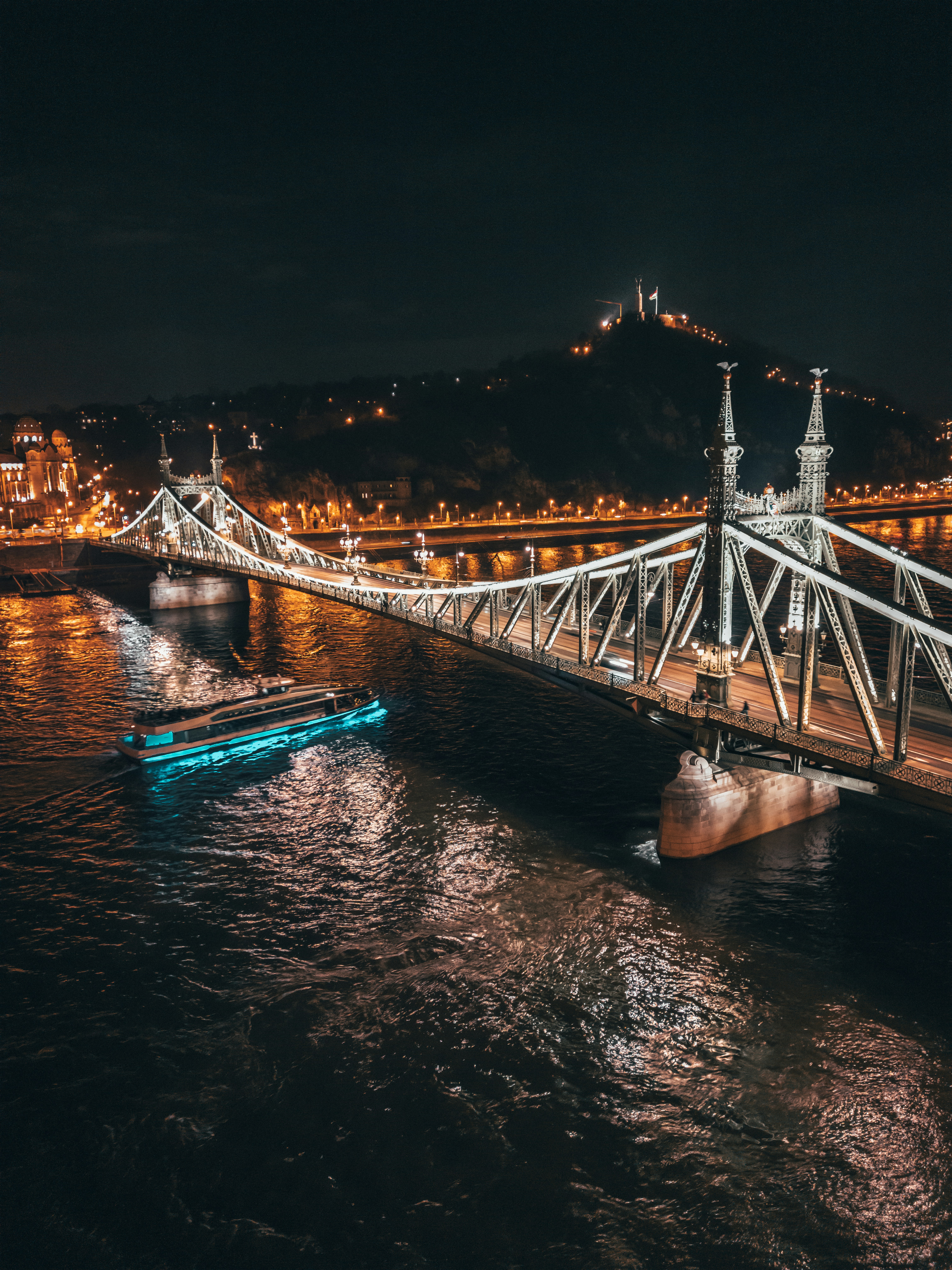 Illuminated Liberty: The Chain Bridge at Night Over Budapest